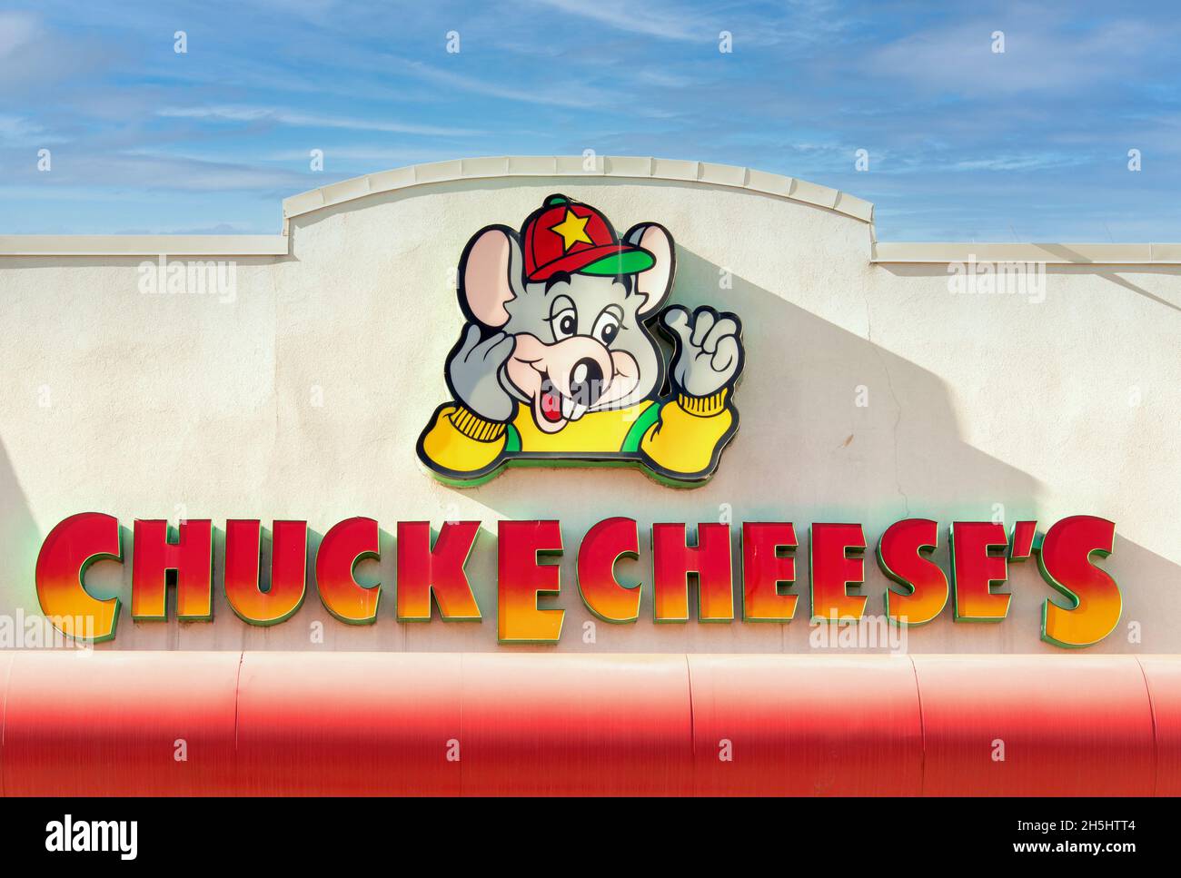 Entrance sign to a Chuck E. Cheese restaurant and entertainment ...