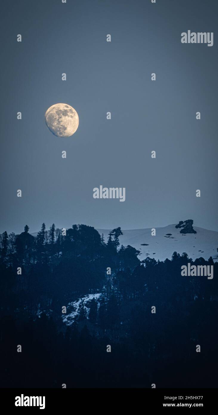 Moon over snow peak india hi-res stock photography and images - Alamy
