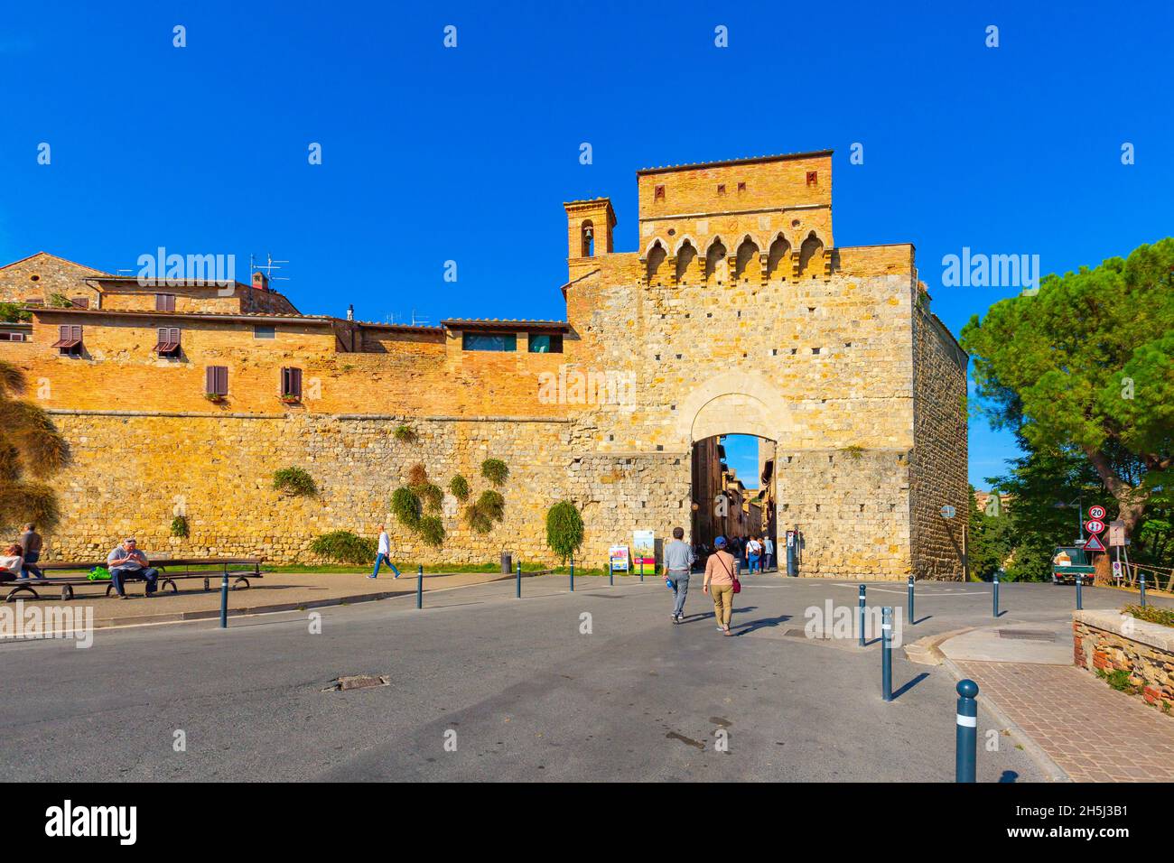 San Gimignano, Tuscany, Italy - October 25, 2018: Arch gate entrance to ...