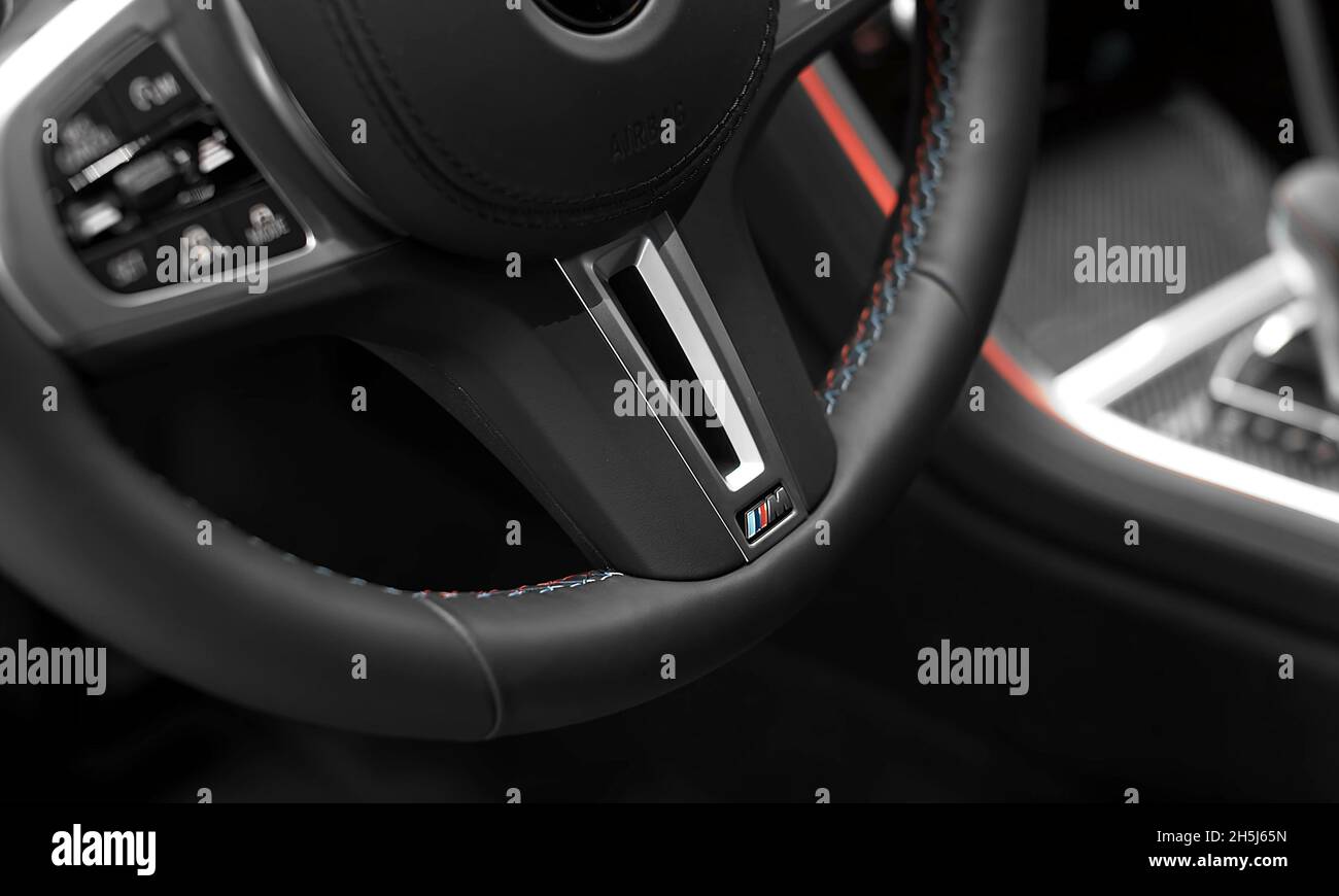 MUNICH, GERMANY - Oct 13, 2021: The steering wheel of a BMW M8 ...