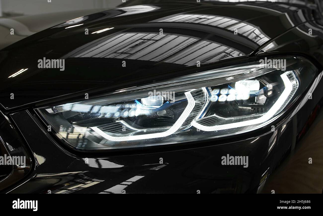 MUNICH, GERMANY - Oct 13, 2021: The headlights of a BMW M8 Competition ...
