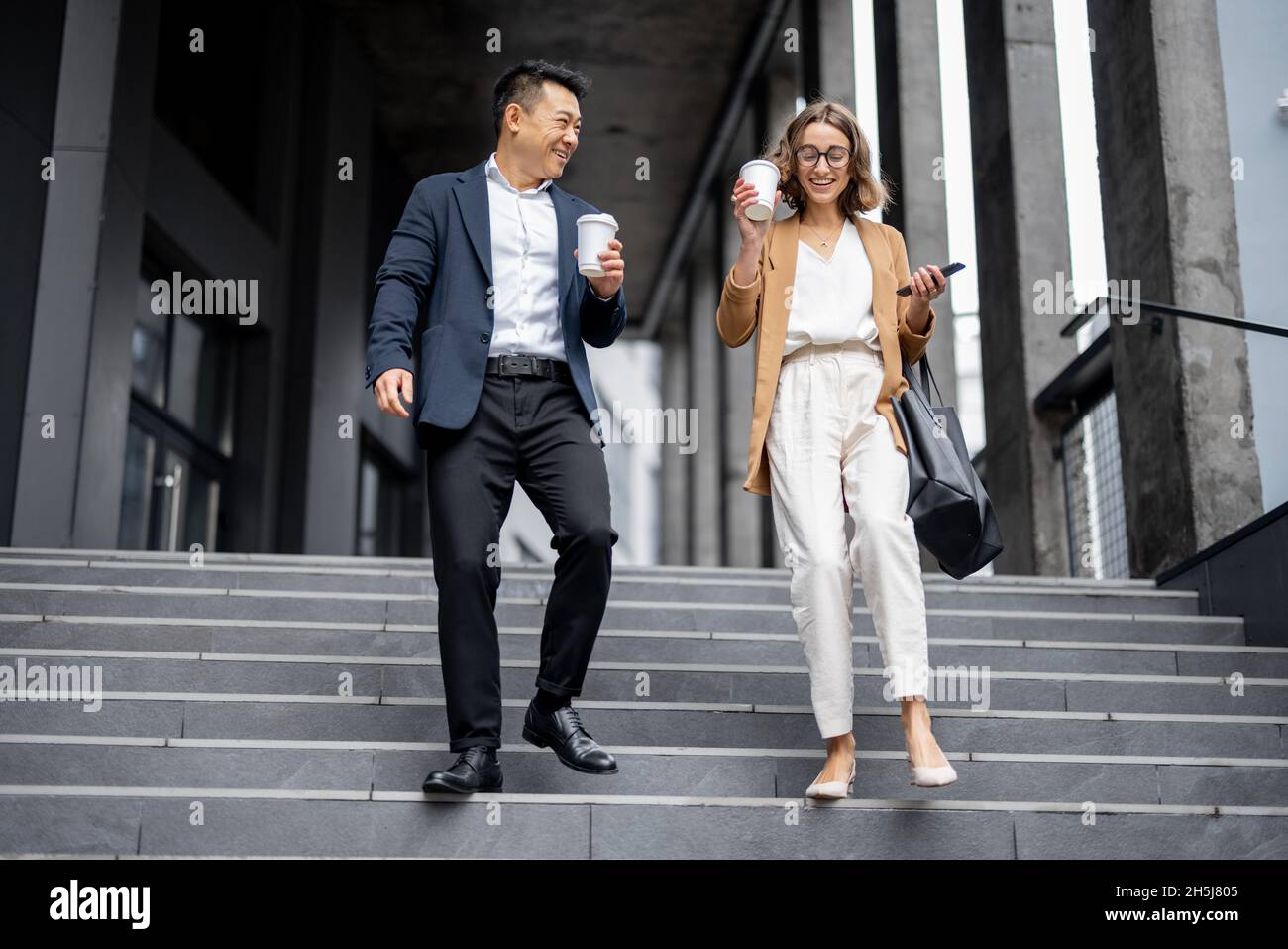 Woman walk talk cellphone in hi-res stock photography and images - Alamy