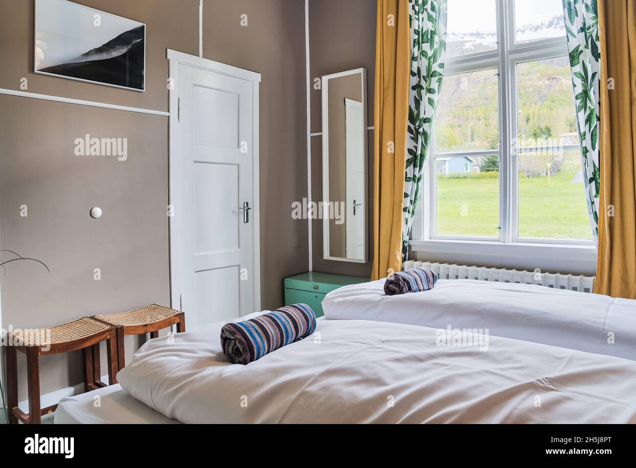Cosy and quiet room with walls covered with warm colours and ecological ...