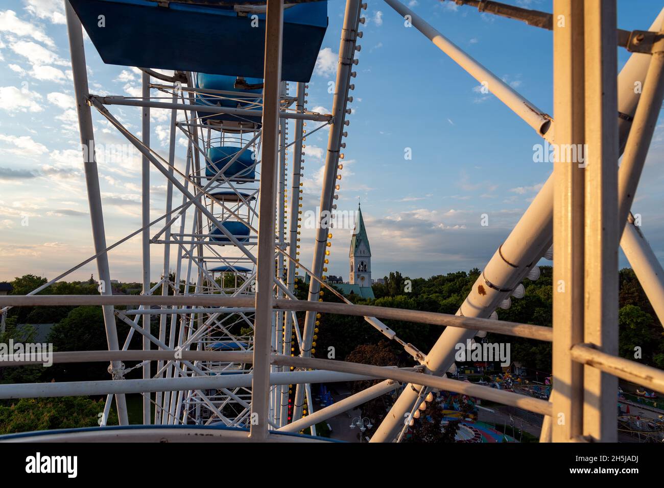 View of Inside of Ferris Wheel view of the structure with cabins. The ...