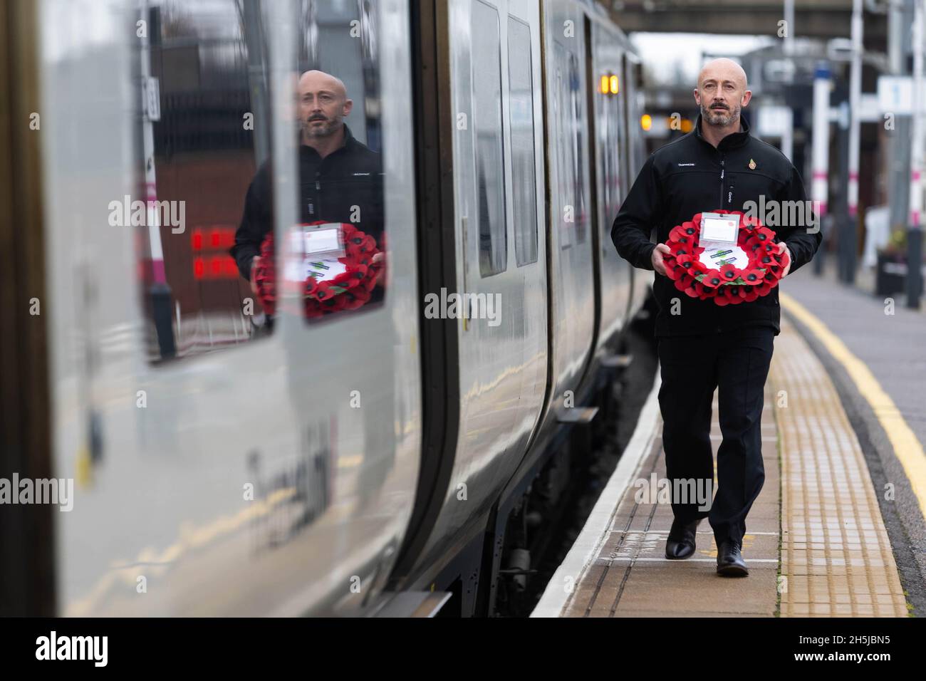 EDITORIAL USE ONLY Thameslink driver, Noel Hughes transports a poppy ...
