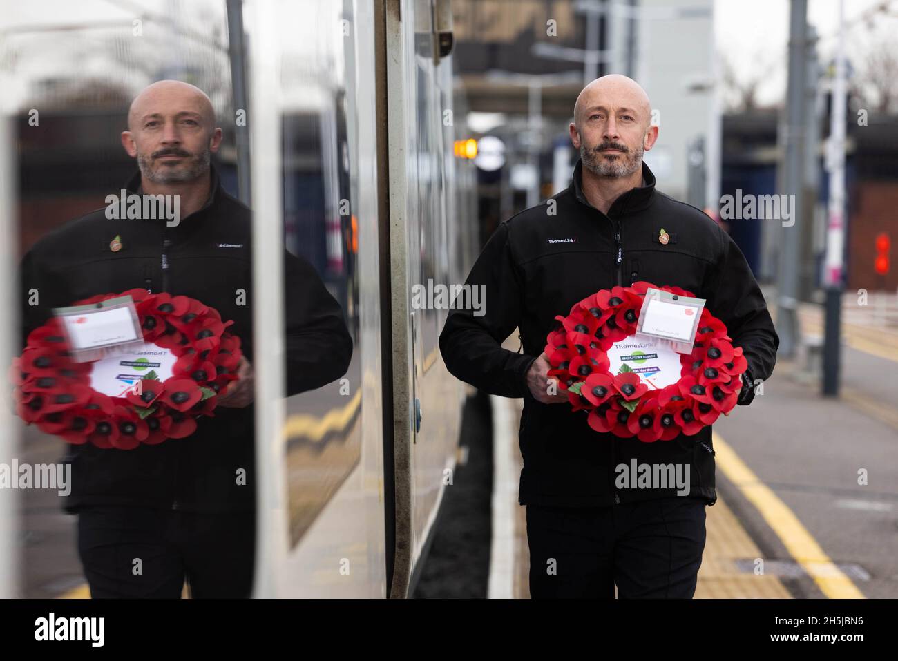 EDITORIAL USE ONLY Thameslink driver, Noel Hughes transports a poppy ...