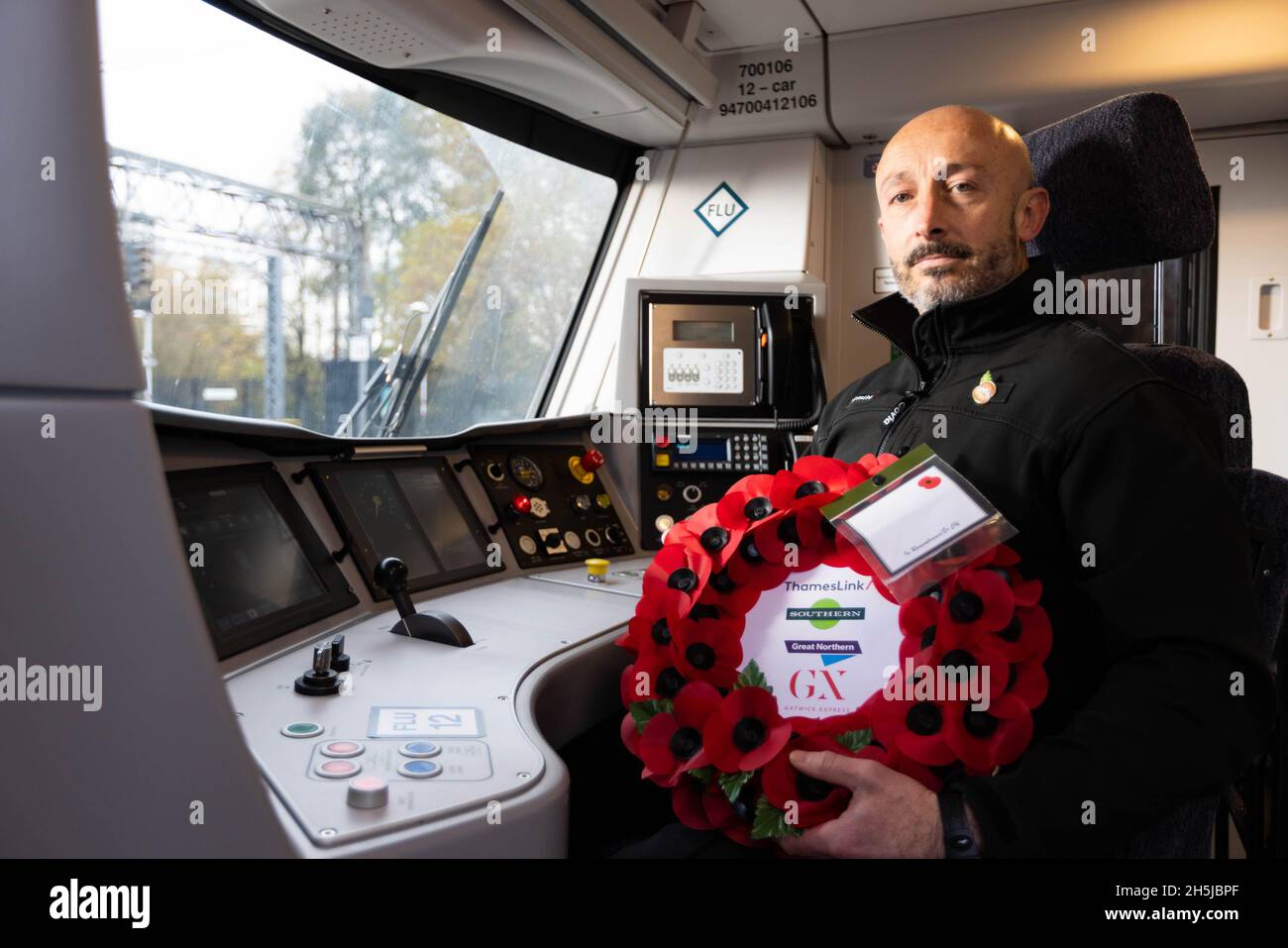 EDITORIAL USE ONLY Thameslink driver, Noel Hughes transports a poppy ...