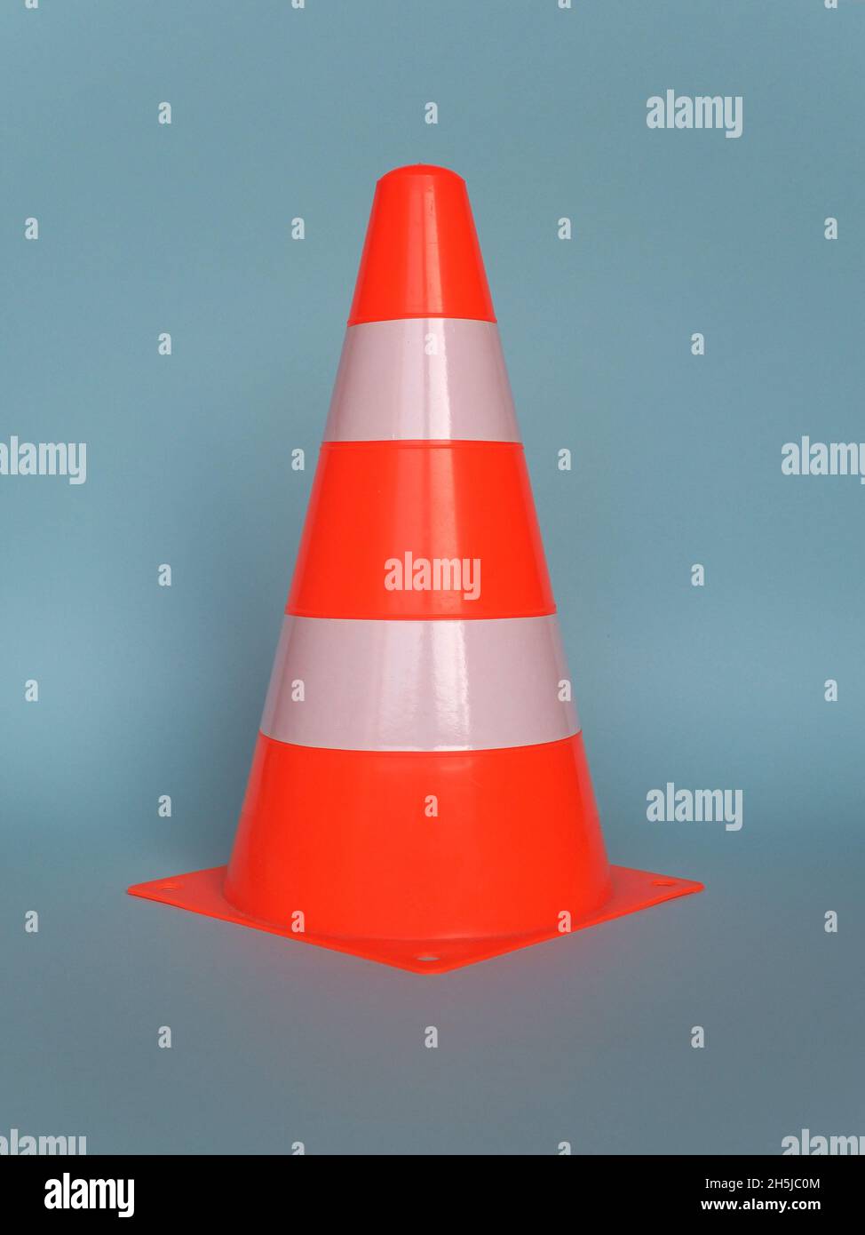 traffic cone to mark road works or temporary obstruction traffic sign ...