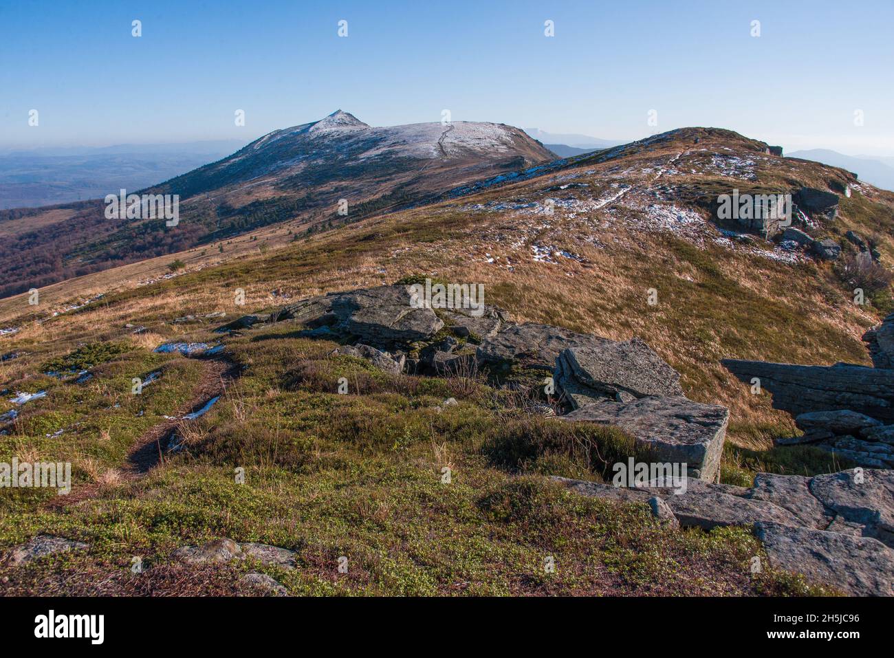 View of hills of vast Water Dividing ridge covered in forest, snow and ...