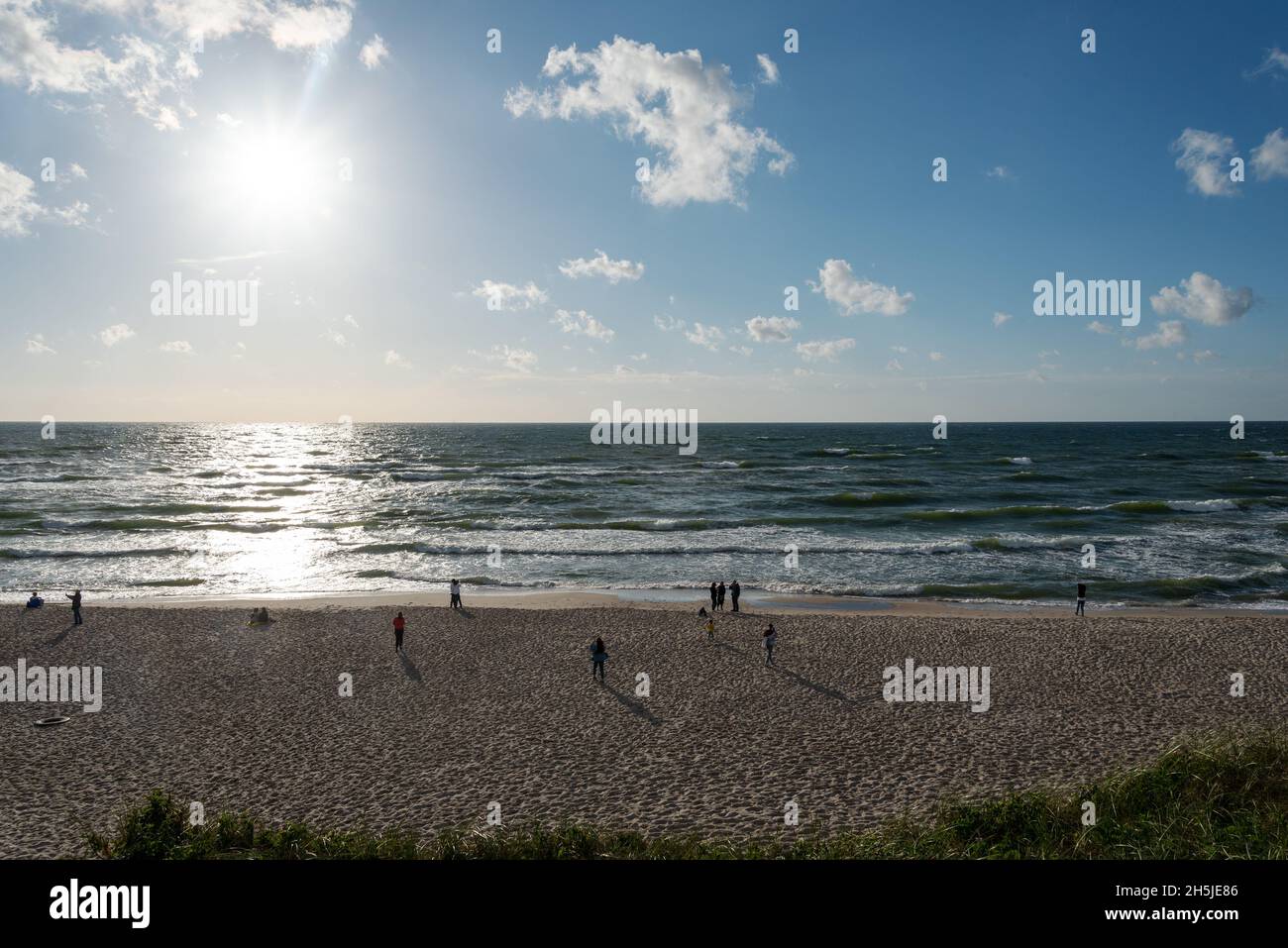 CURONIAN SPIT, Kaliningrad June 2021 A group of people walks on the ...