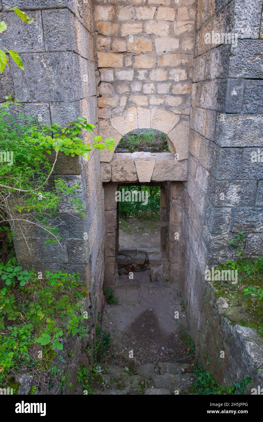 the archway in the stone wall is beautiful and old Stock Photo - Alamy