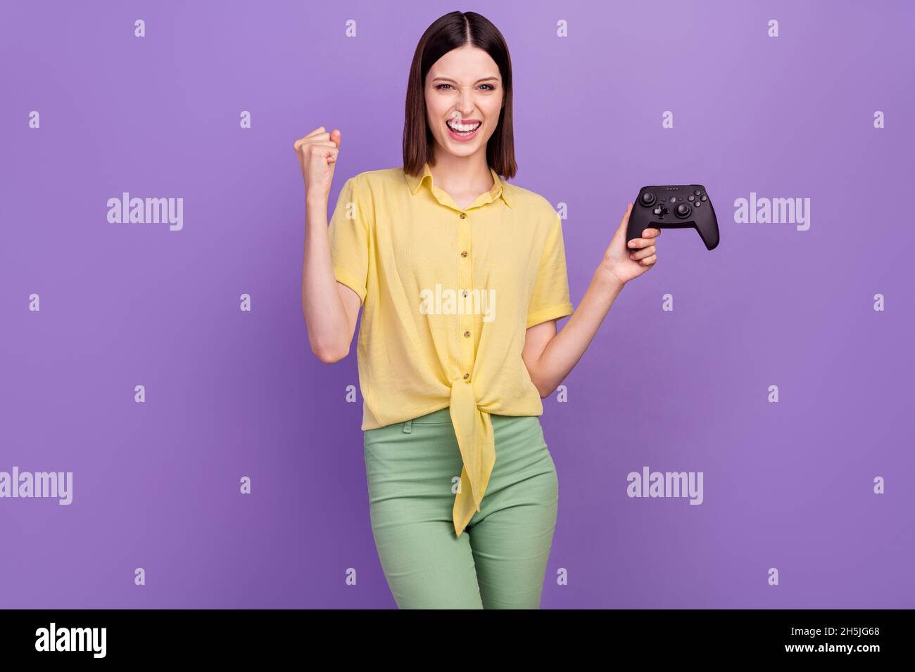 Photo of young cheerful girl rejoice victory win competition fists hand ...
