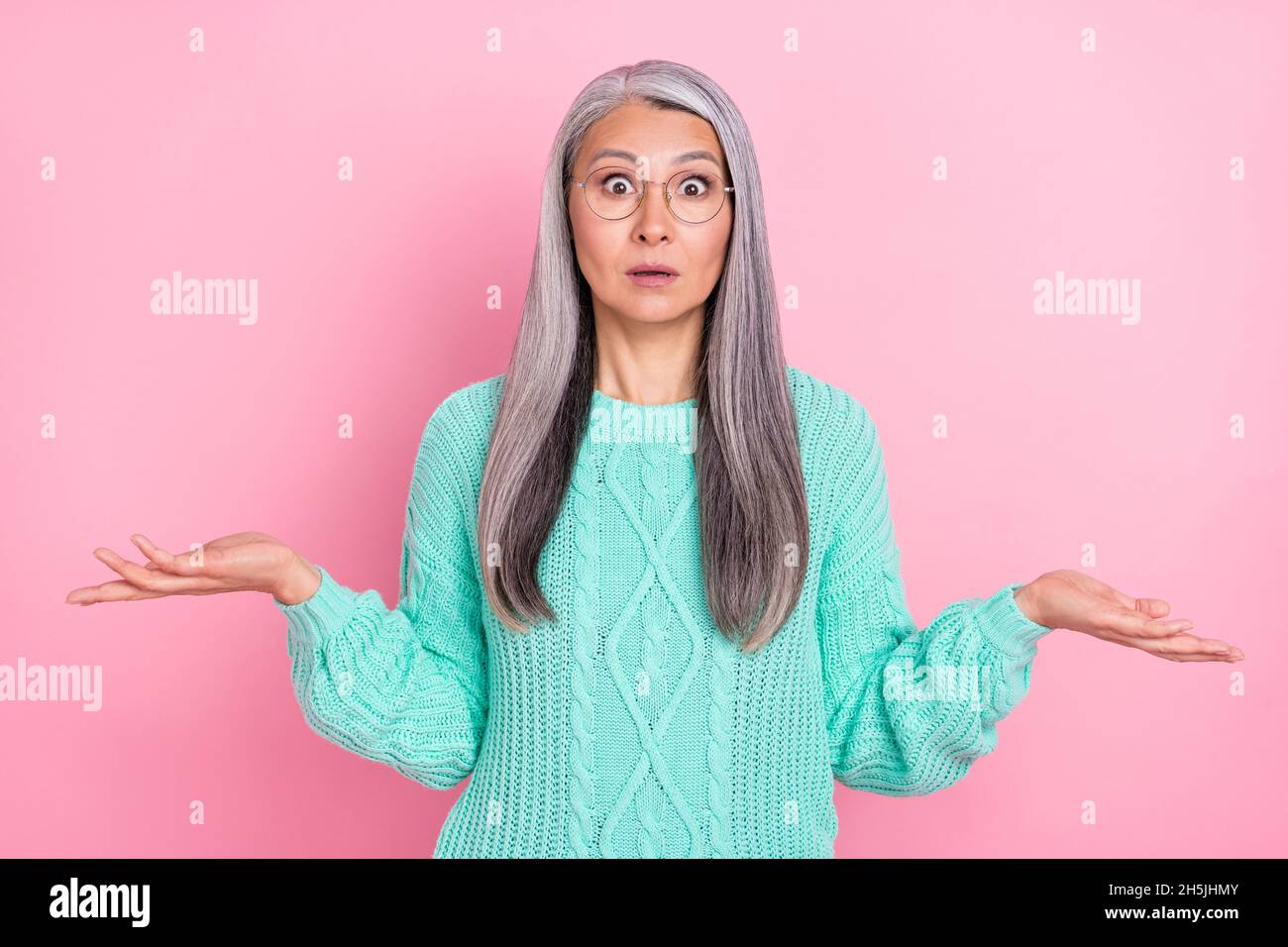 Photo of unsure grey hairdo old lady shrug shoulders wear eyewear teal ...