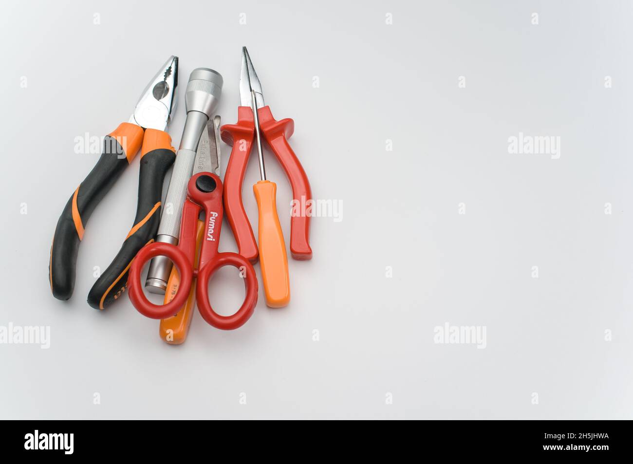 COMO, ITALY - Nov 09, 2021: tools and utensils on a white background ...