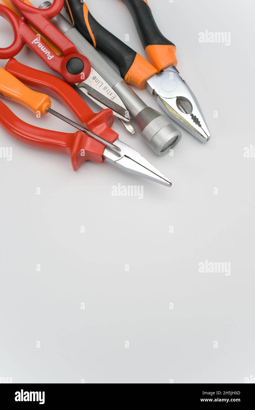 COMO, ITALY - Nov 09, 2021: tools and utensils on a white background ...