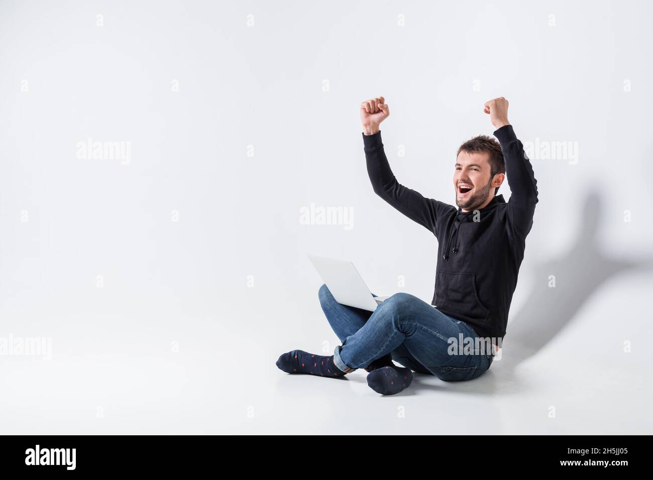 emotional man and notebook Stock Photo - Alamy