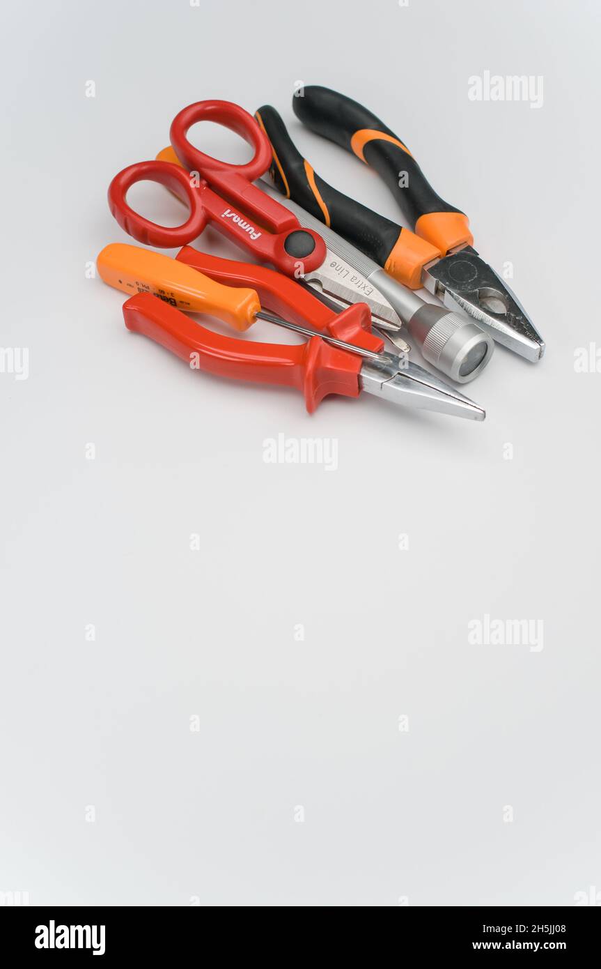 COMO, ITALY - Nov 09, 2021: tools and utensils on a white background ...