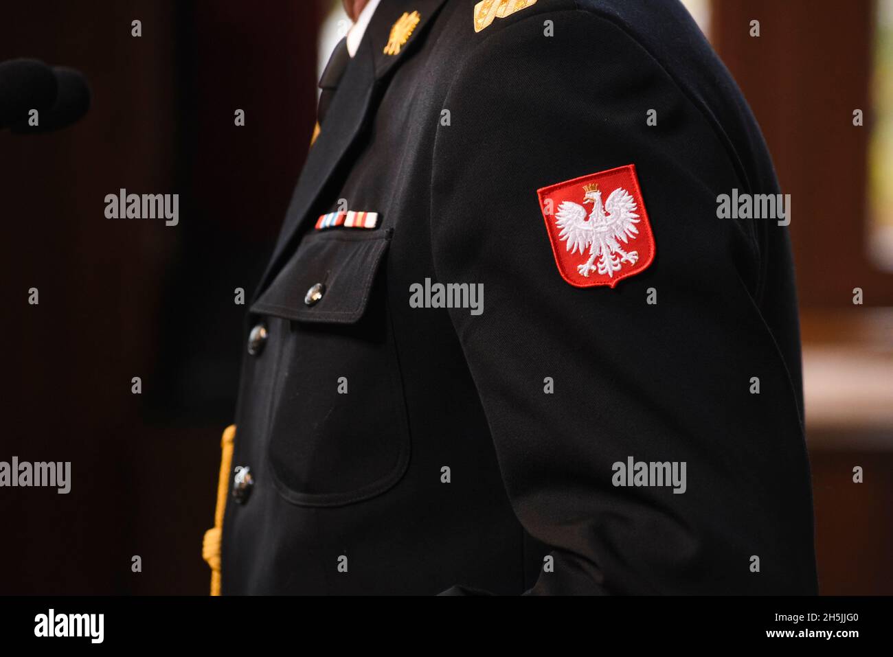 Polish fire brigade gala uniform with decorations Stock Photo - Alamy