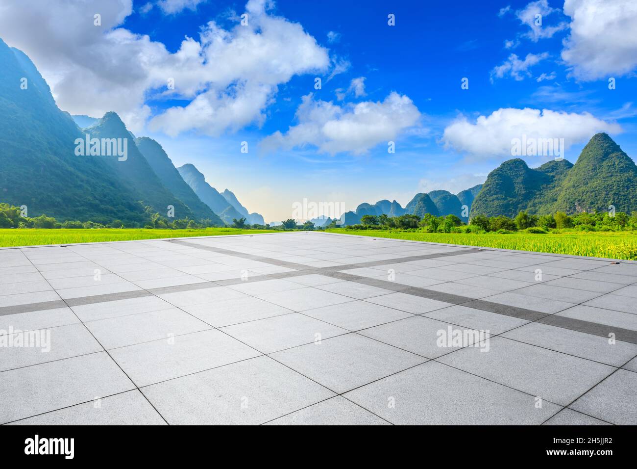 Wide square floor and green mountain natural scenery in Guilin,China ...