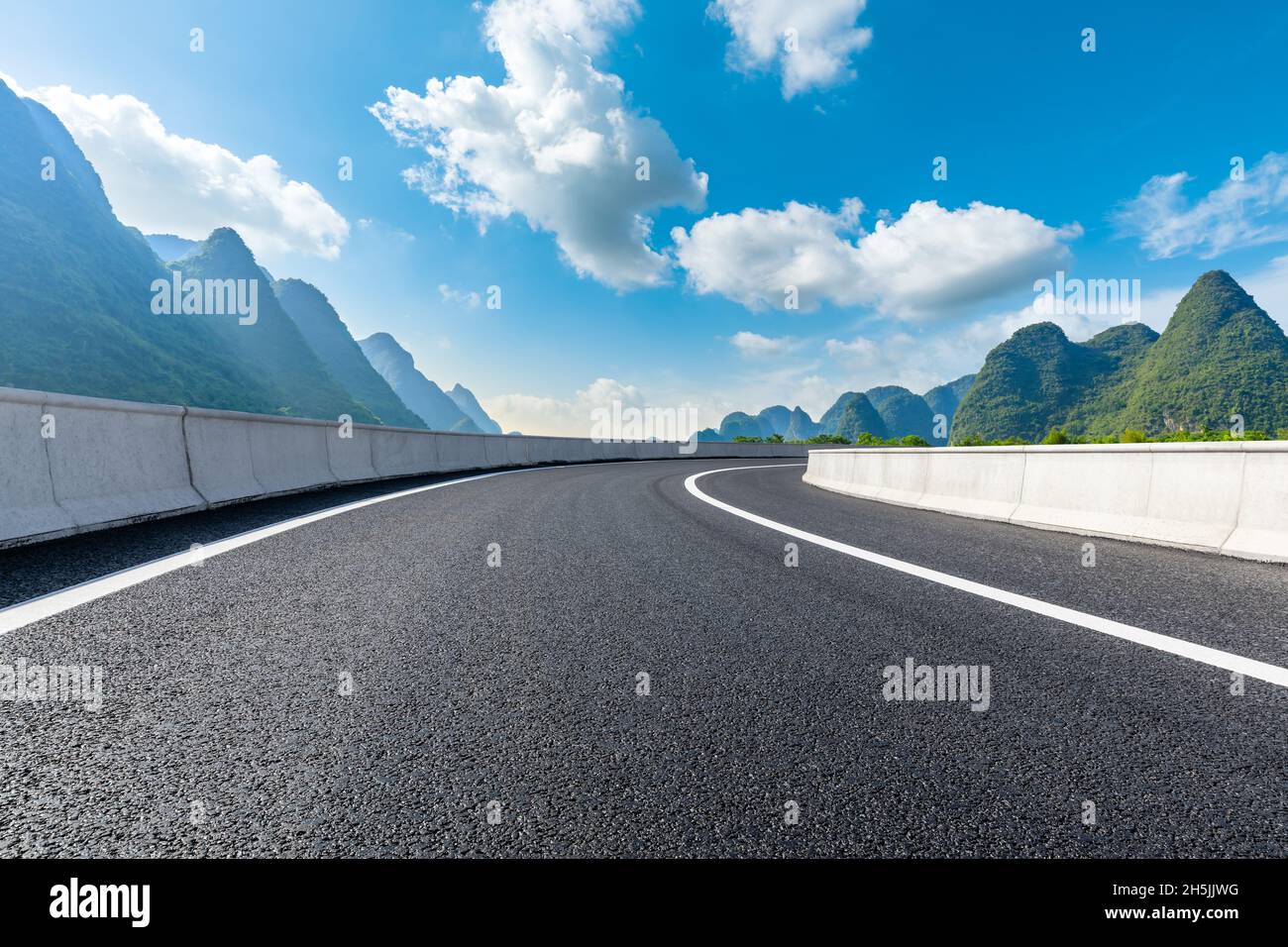 Asphalt highway and green mountain natural scenery in Guilin,China Stock Photo - Alamy