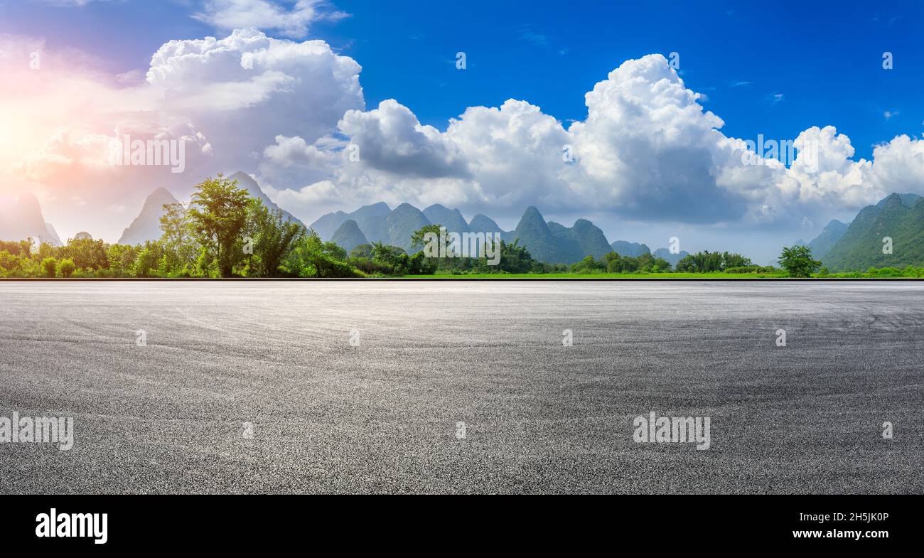 Asphalt race track and green mountain natural scenery in Guilin,China ...