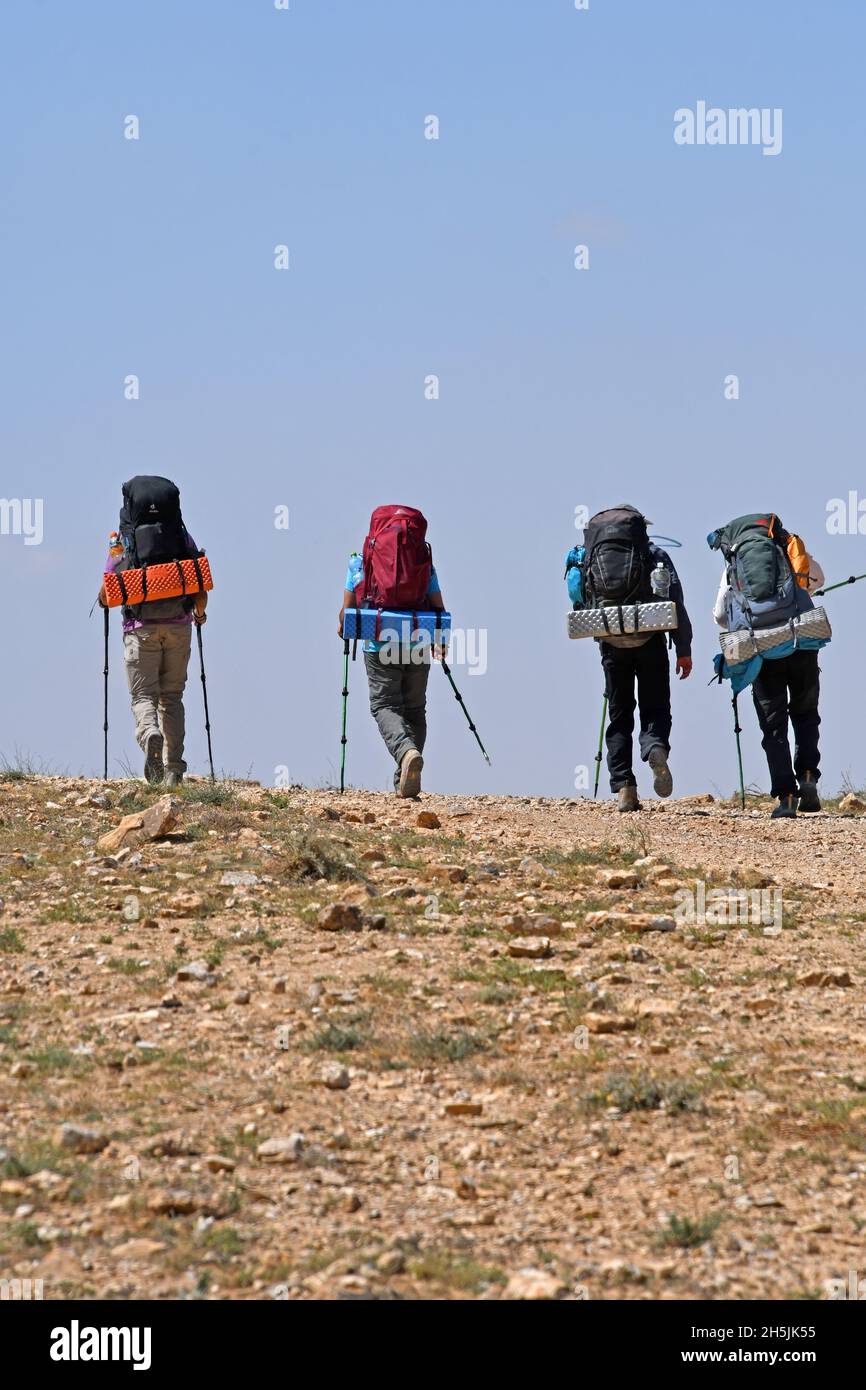 Walkers, backpackers in the desert Stock Photo - Alamy