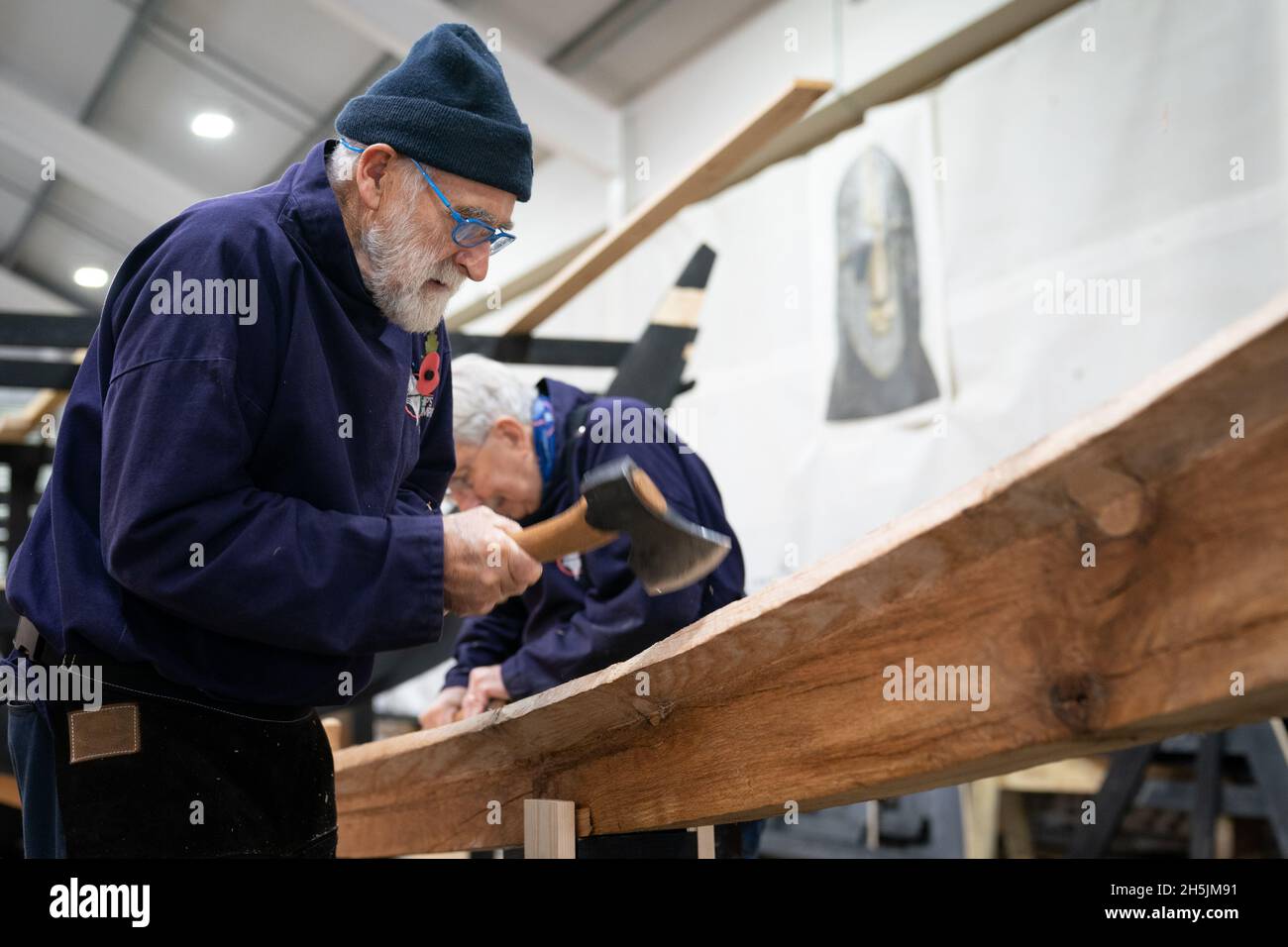 Bryan Knibbs (left) and David Turner work on the keel of the 88ft-long ...
