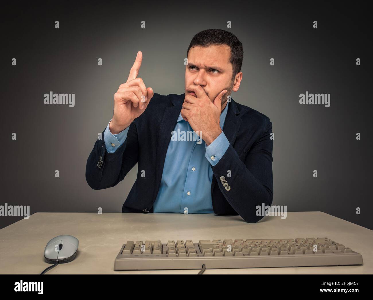Raised his index finger hi-res stock photography and images - Alamy