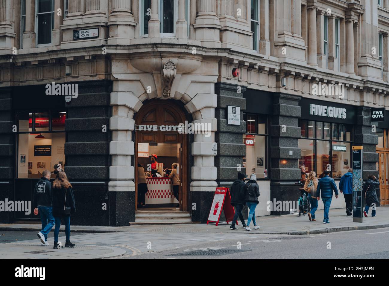London, UK - October 23, 2021: Exterior of Five Guys, an American fast ...