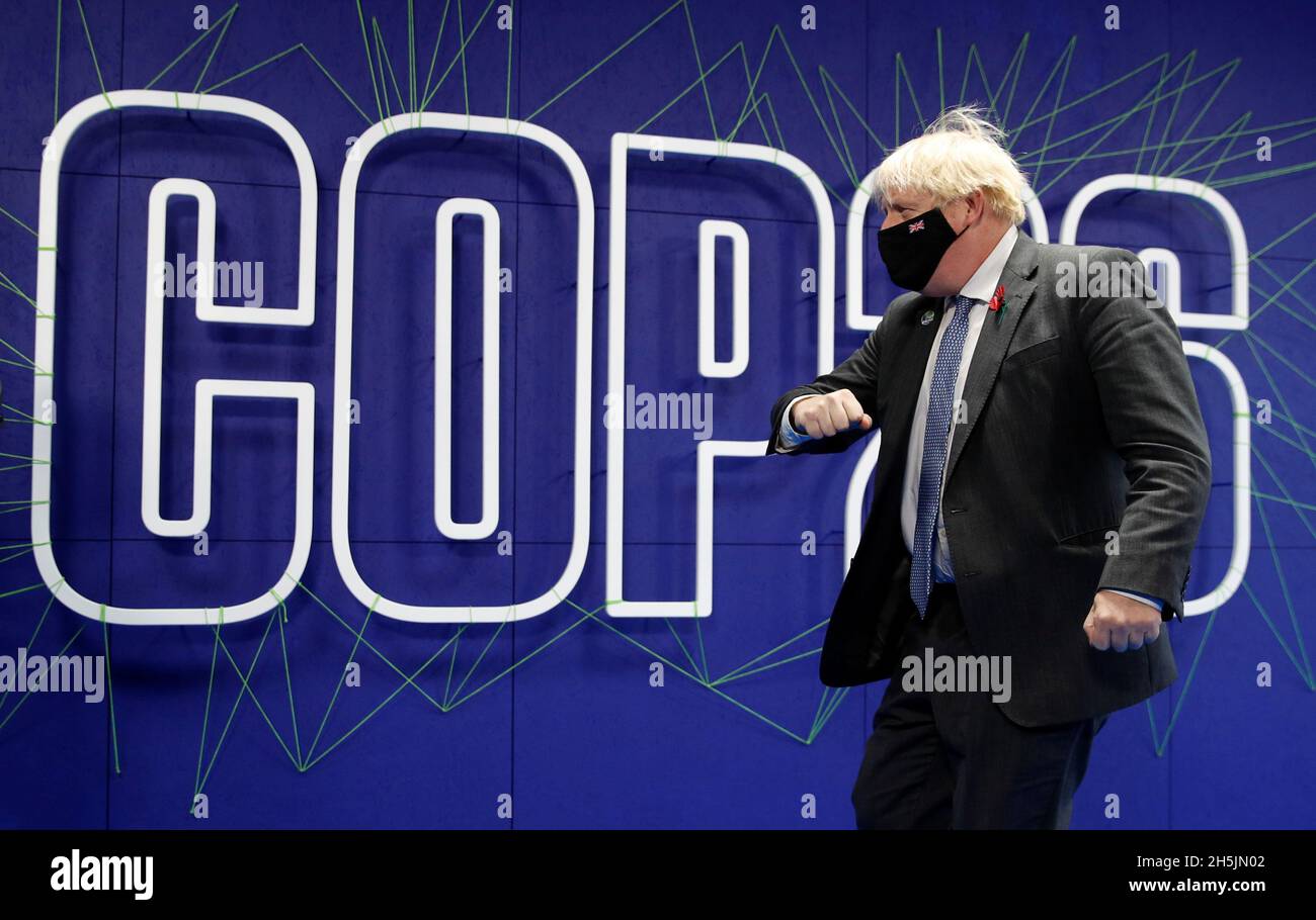 Prime Minister Boris Johnson arrives at the Cop26 summit at the ...