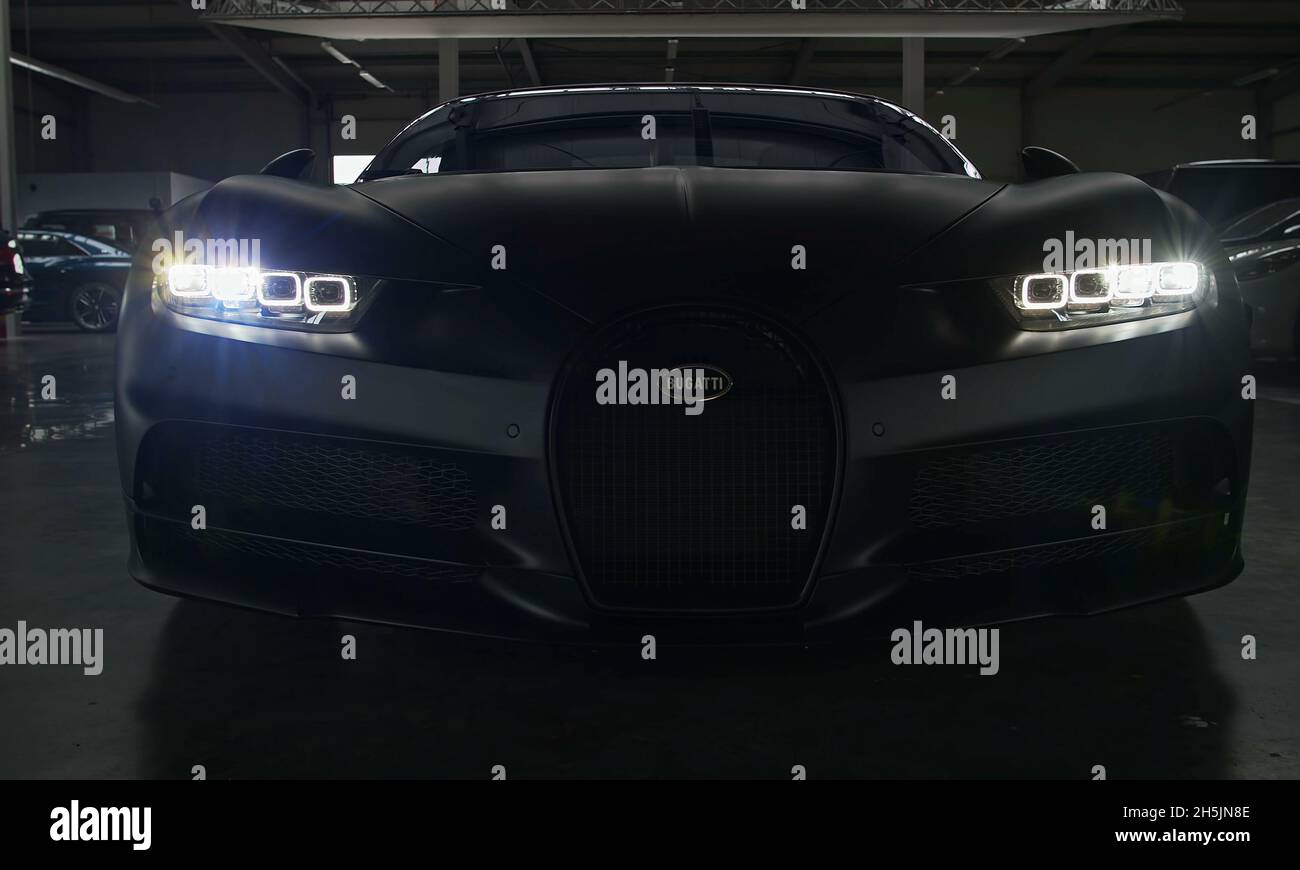 MUNICH, GERMANY - Oct 13, 2021: A front view of matte black Bugatti ...