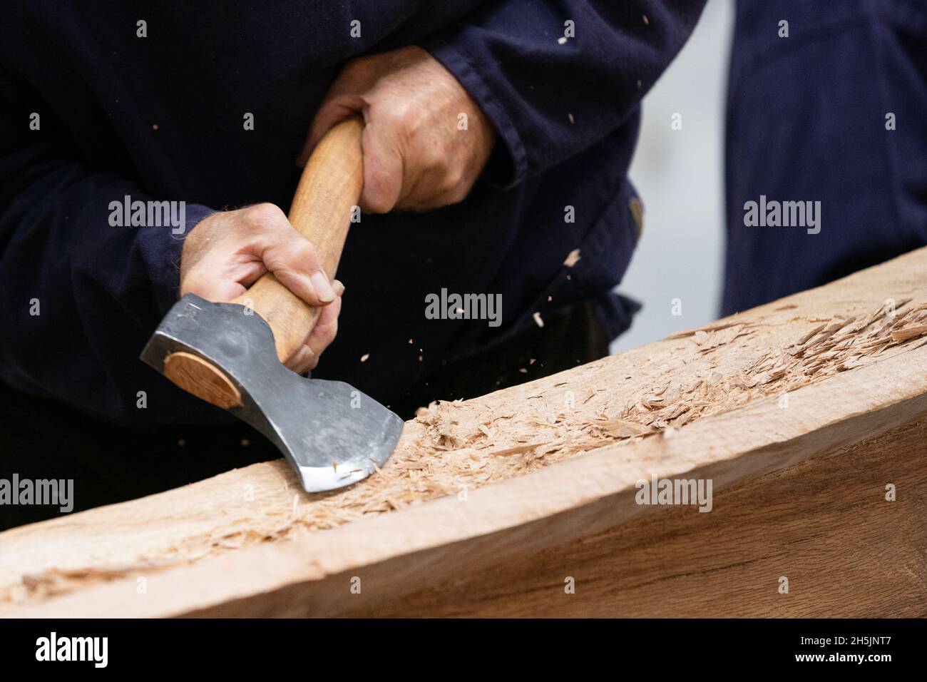 A team of volunteers work on the keel of the 88ft-long replica of the ...