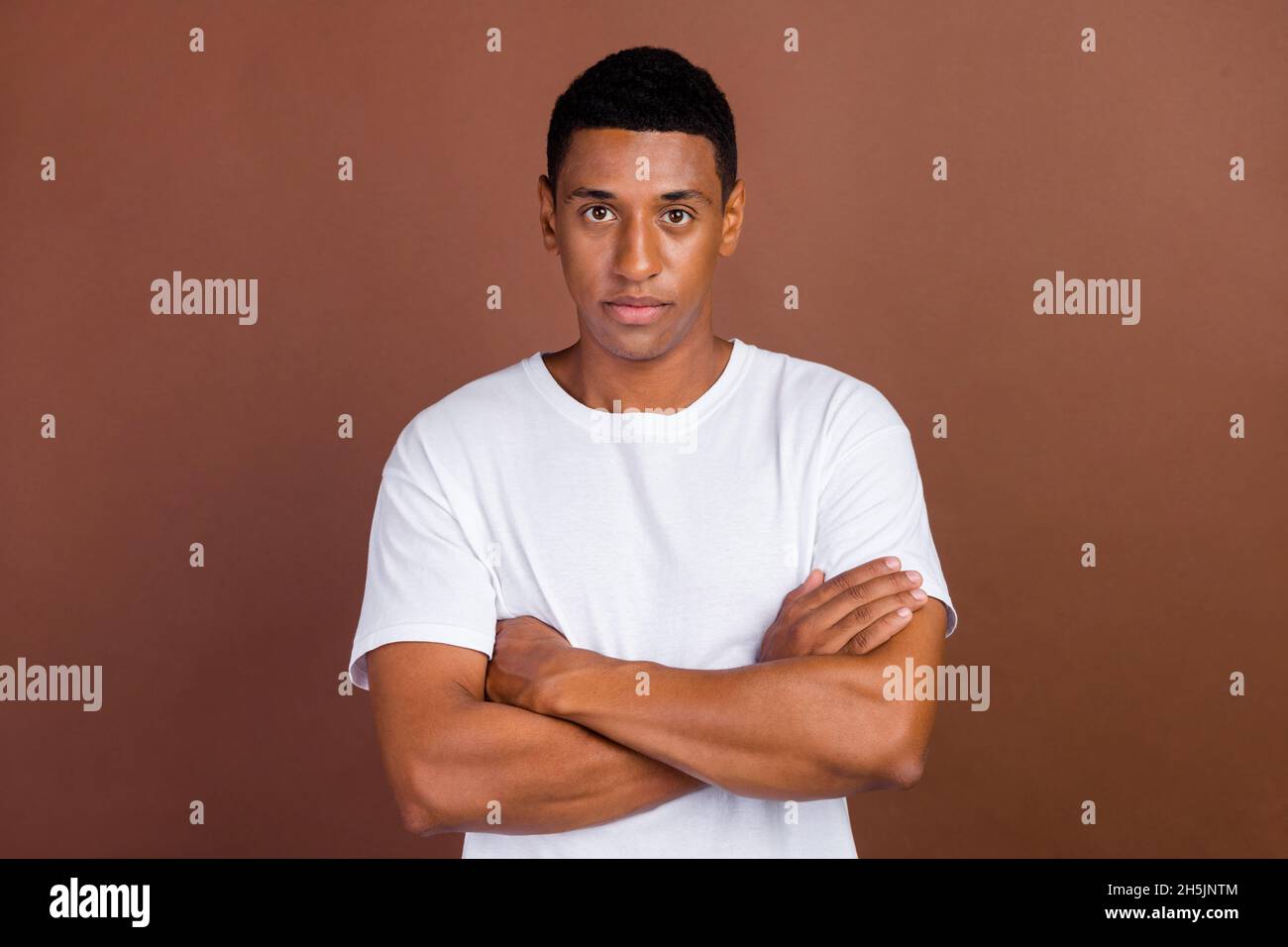 Photo of young african handsome man crossed hands confident casual ...