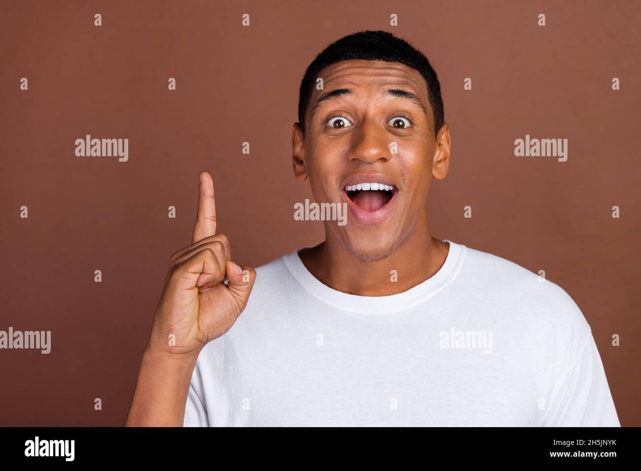 Photo of young cheerful african man clever have idea creative brilliant ...