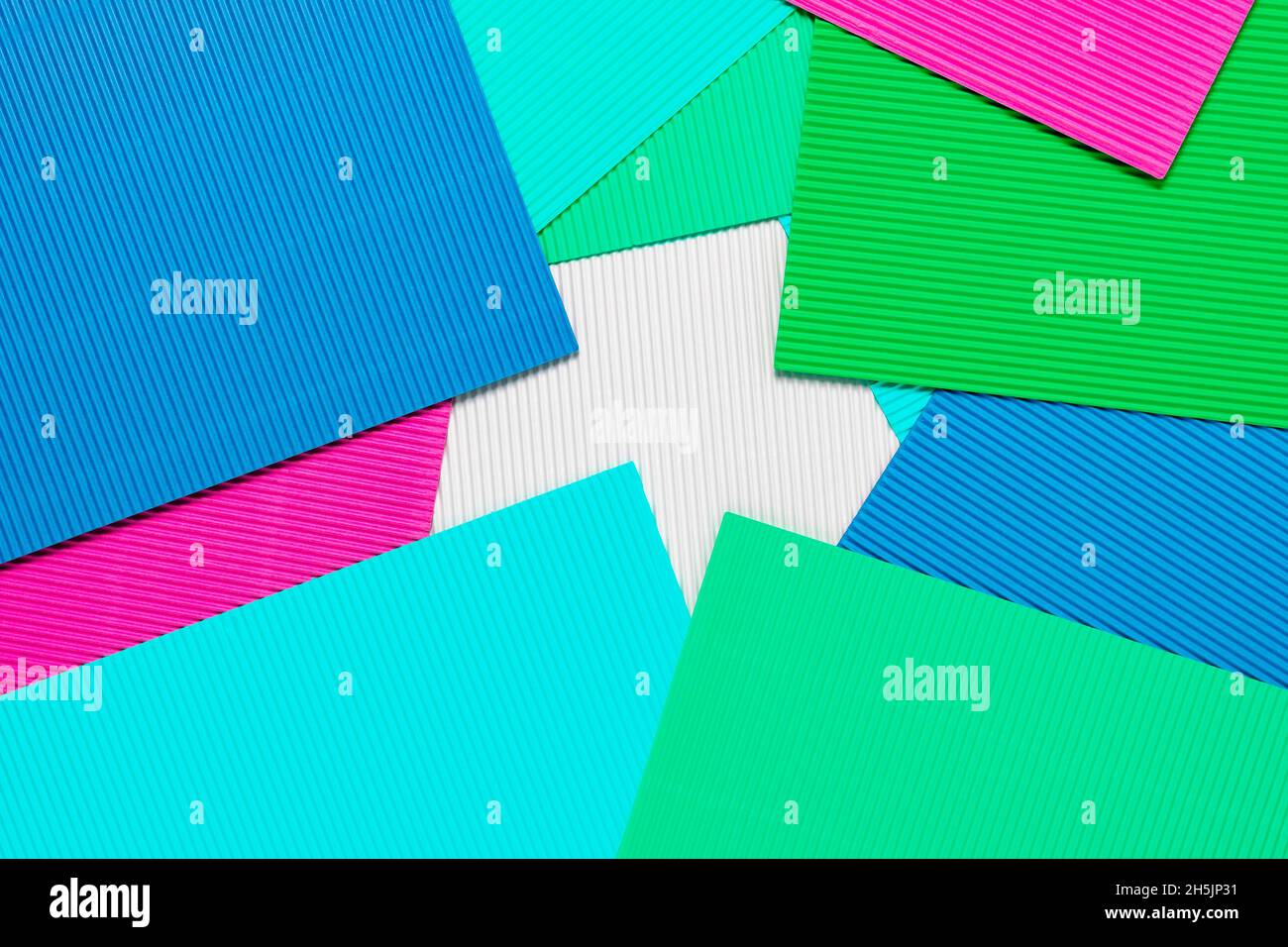 Striped colored embossed paper sheets with copy space. Can be used as ...