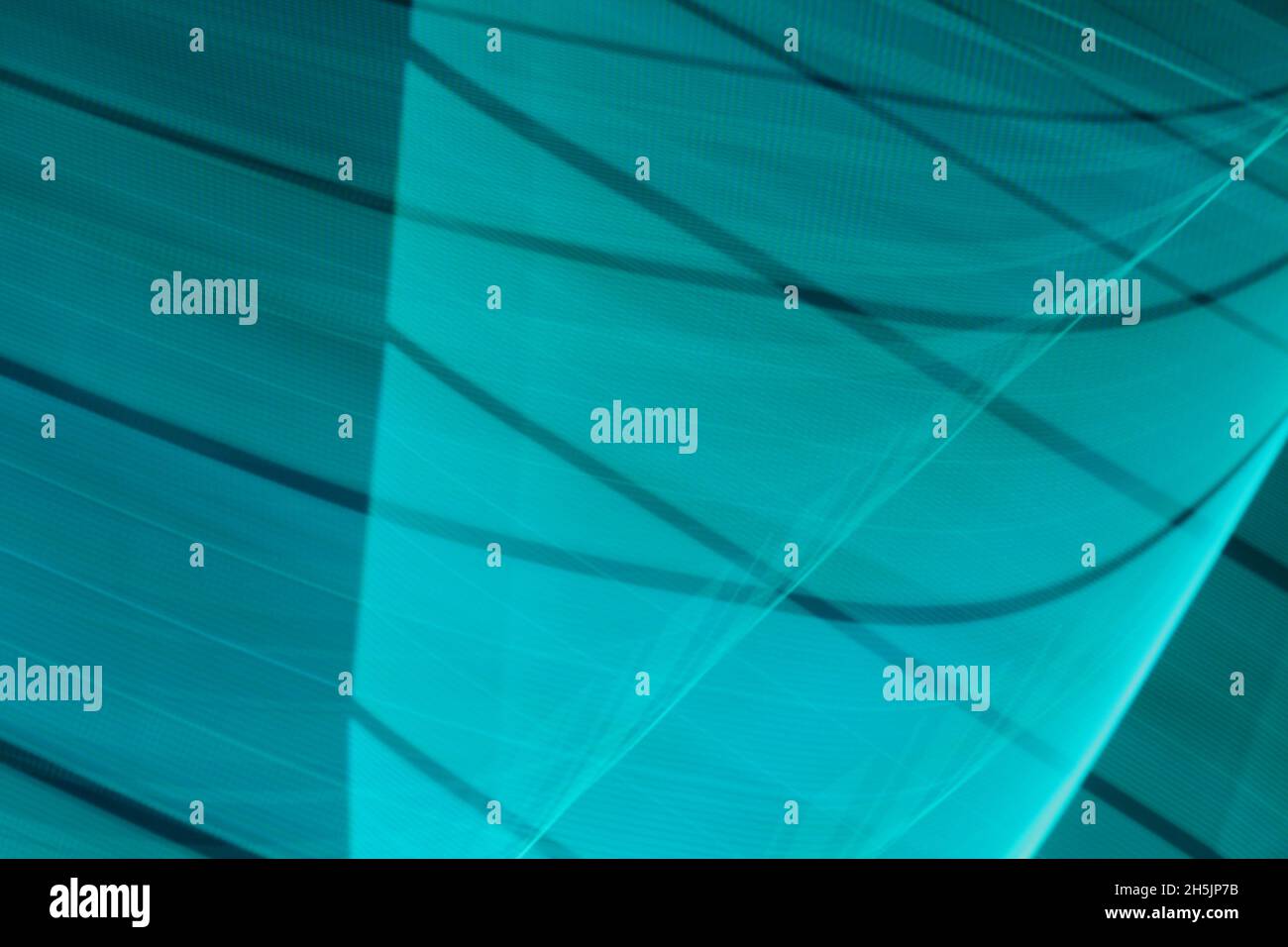 Incredible reflected blue neon light layers Stock Photo - Alamy