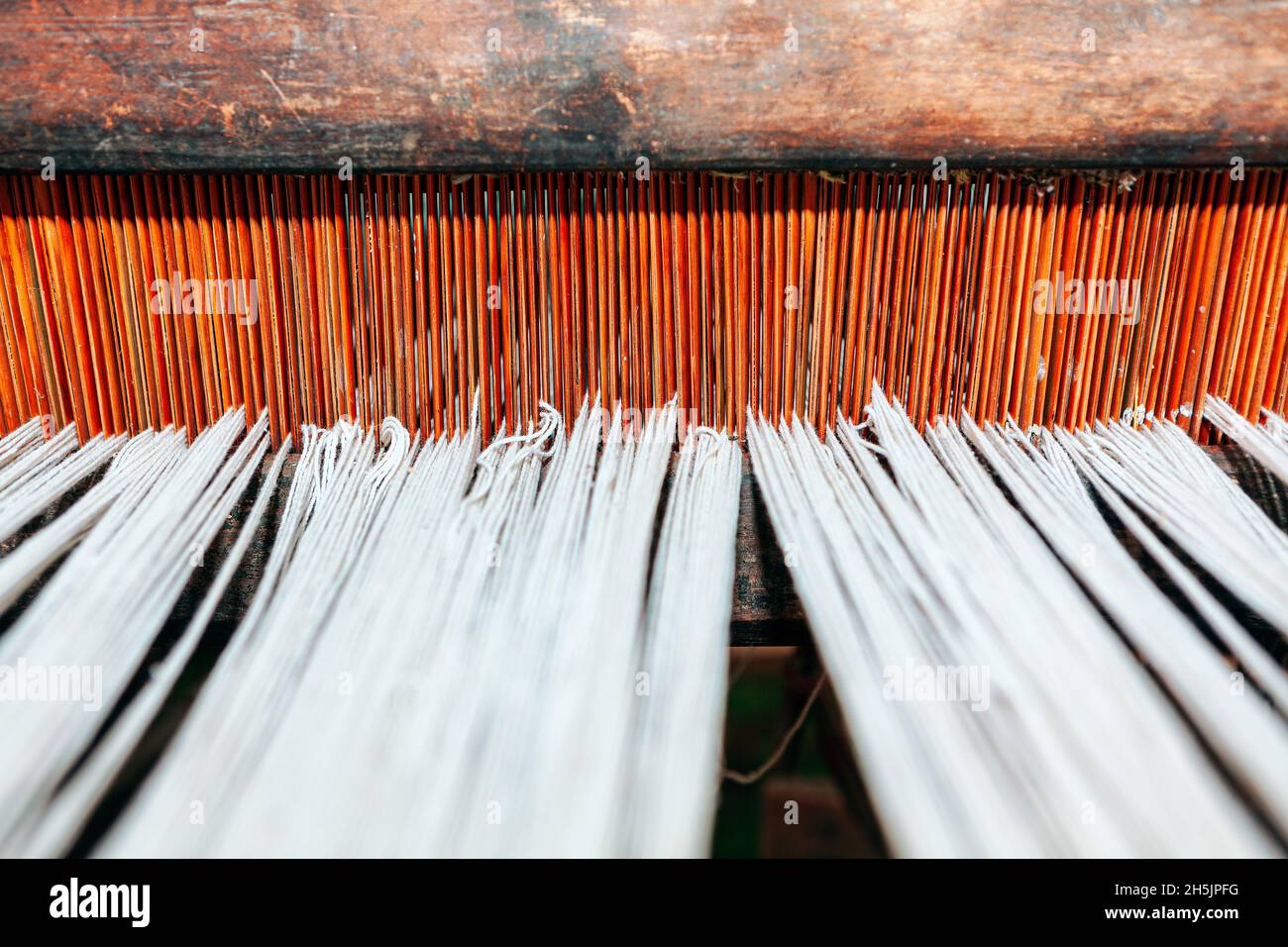 Woven threads background . Tapestry Loom with wooden base . Ancient ...