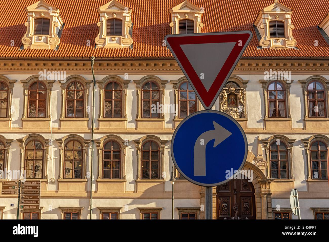 Give way and turn right traffic sign on background of the house Stock ...