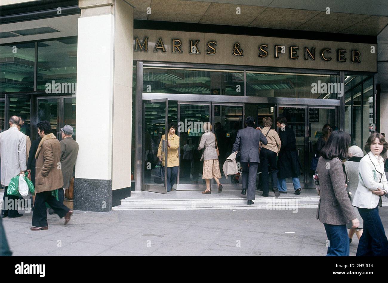 London 1982. A street view of Oxford street with the entrance of Marks ...