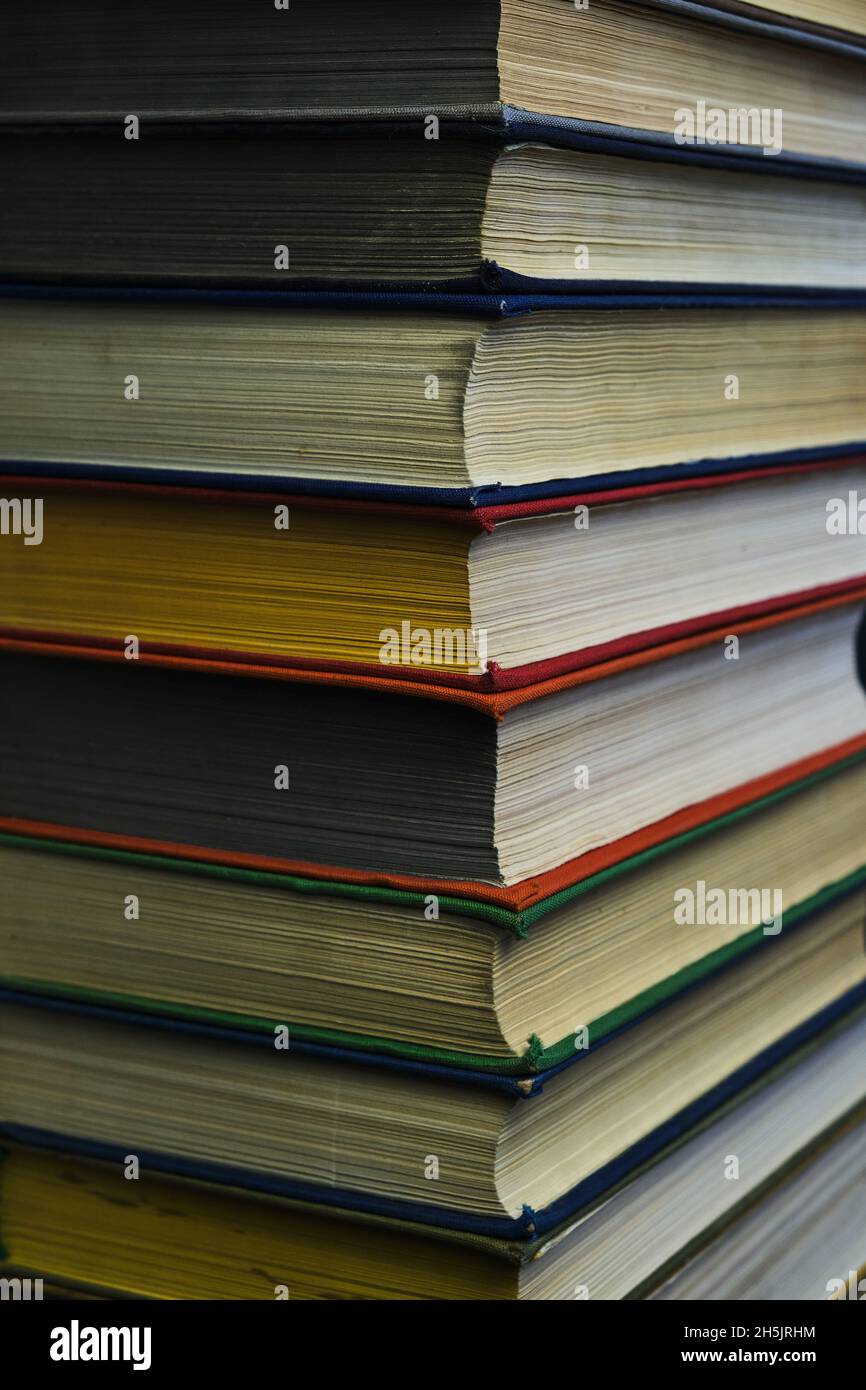 Stack of battered old books.Retro library and books Stock Photo - Alamy