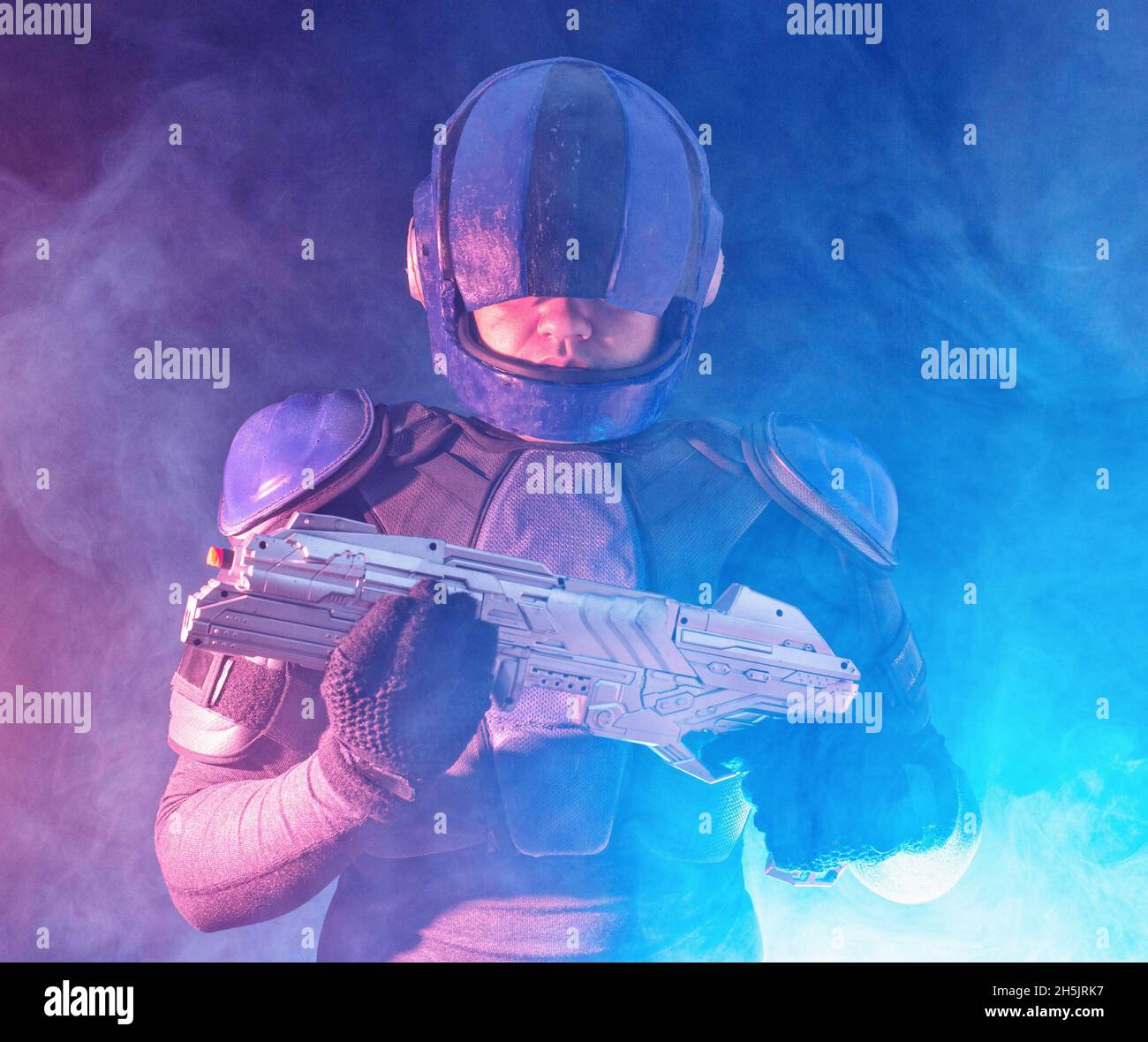 Cyberpunk future concept. Police officer reloads futuristic shotgun in ...