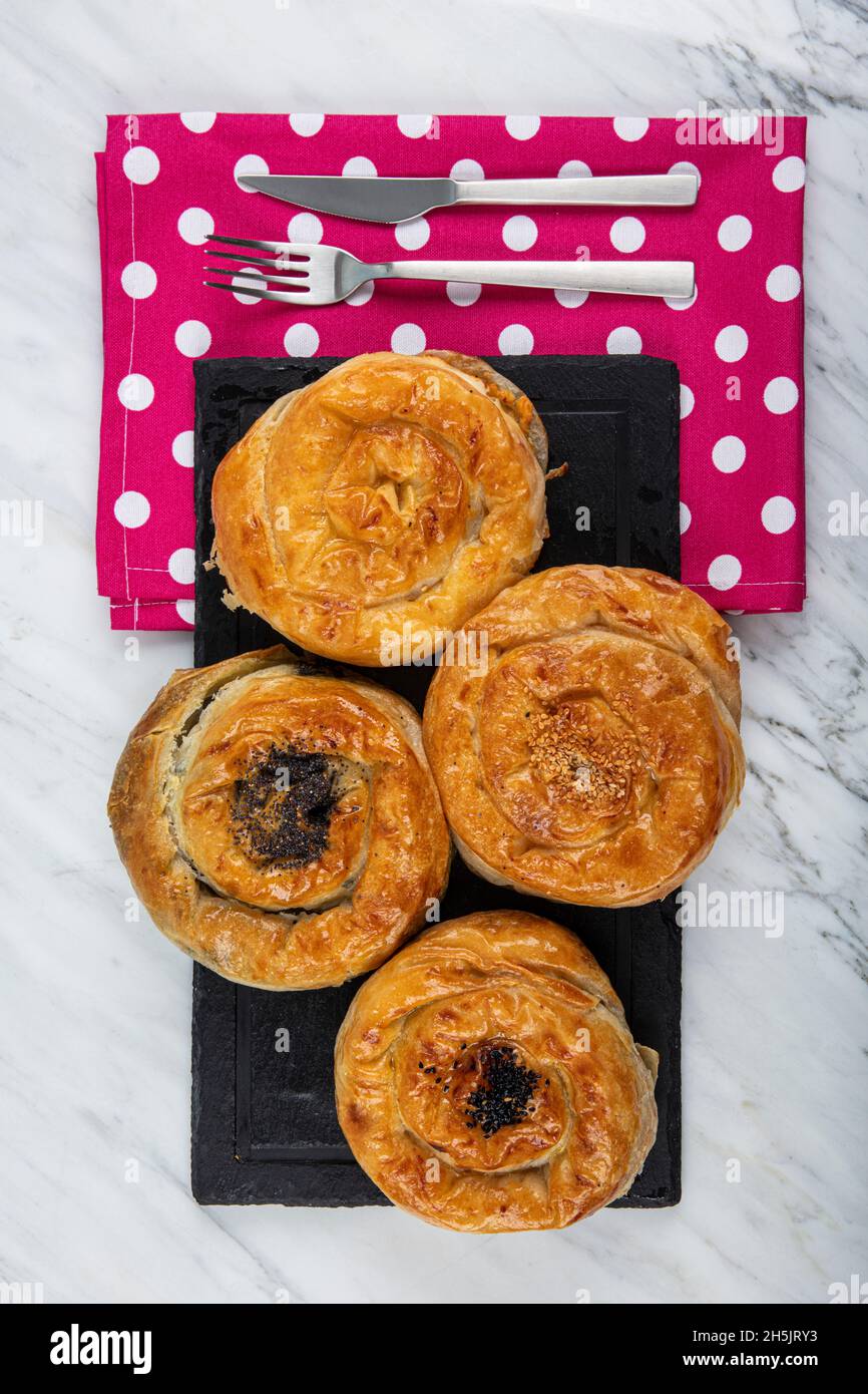 Homemade turkish acma with nigella seeds. Freshly backed swirl buns ...