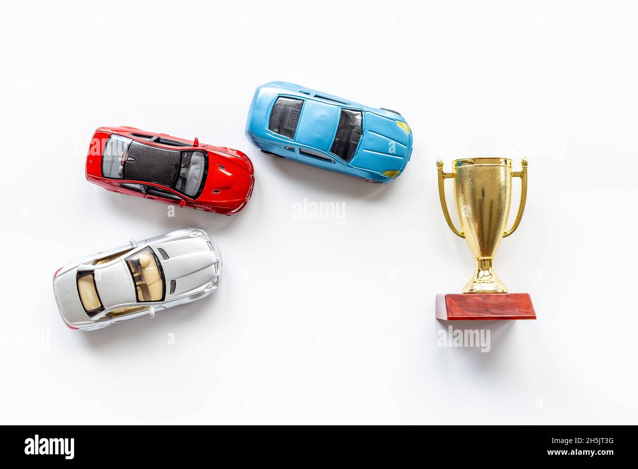 Sport rally car champion award - golden trophy cup with car models, top ...