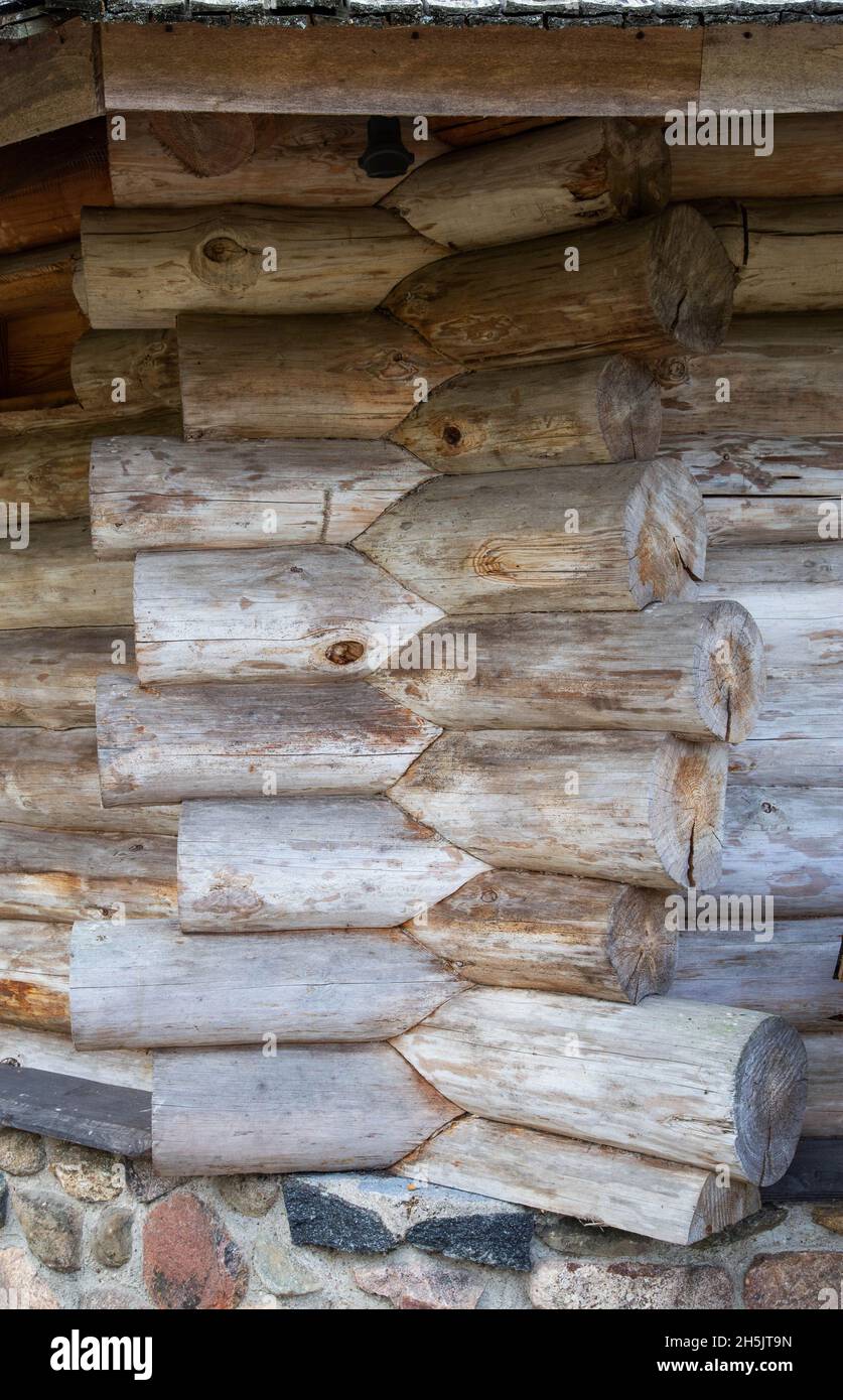 Warm corner of a log wooden blockhouse, close-up. Wooden house ...
