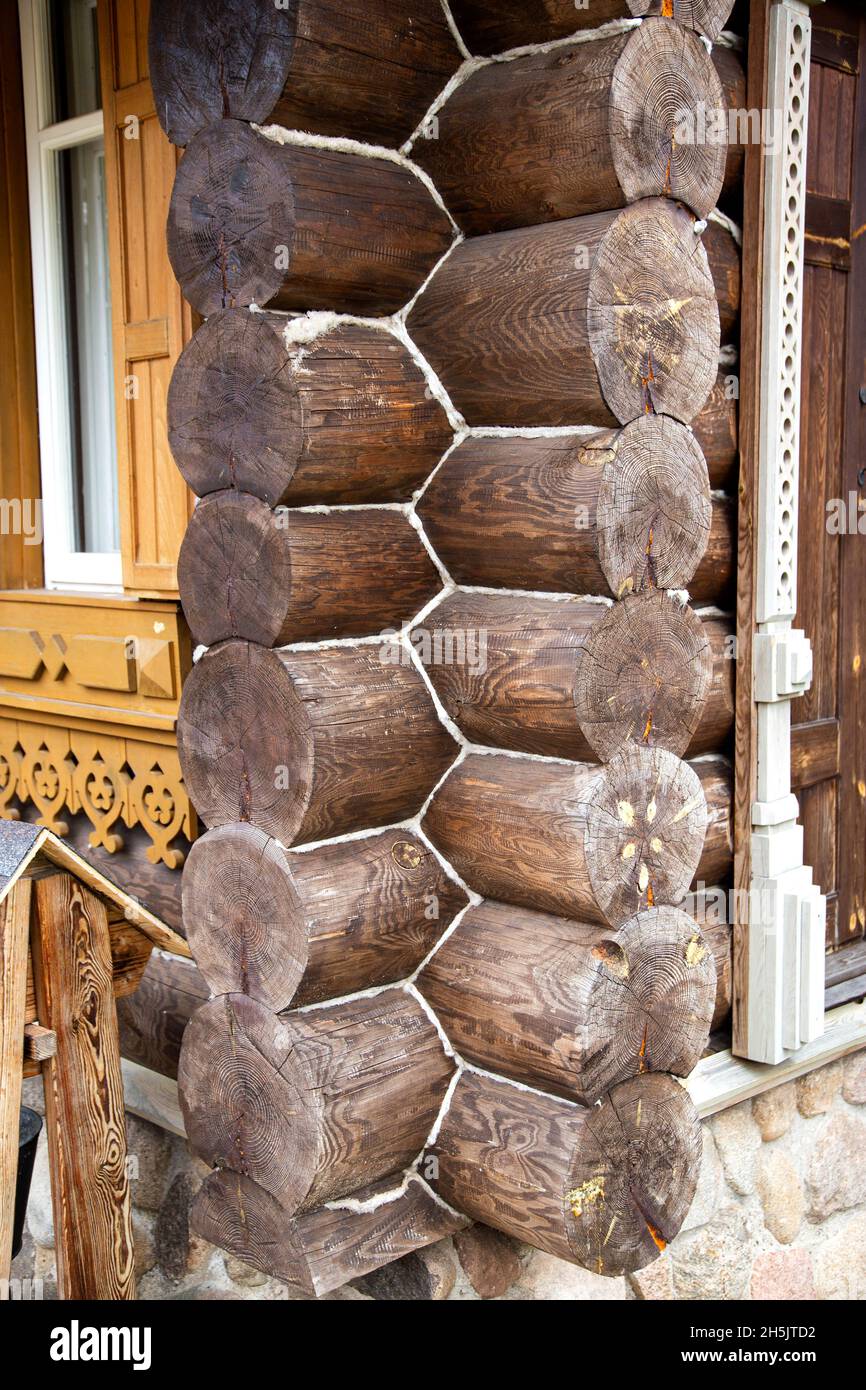 Warm corner of a log wooden blockhouse, close-up. Wooden house ...