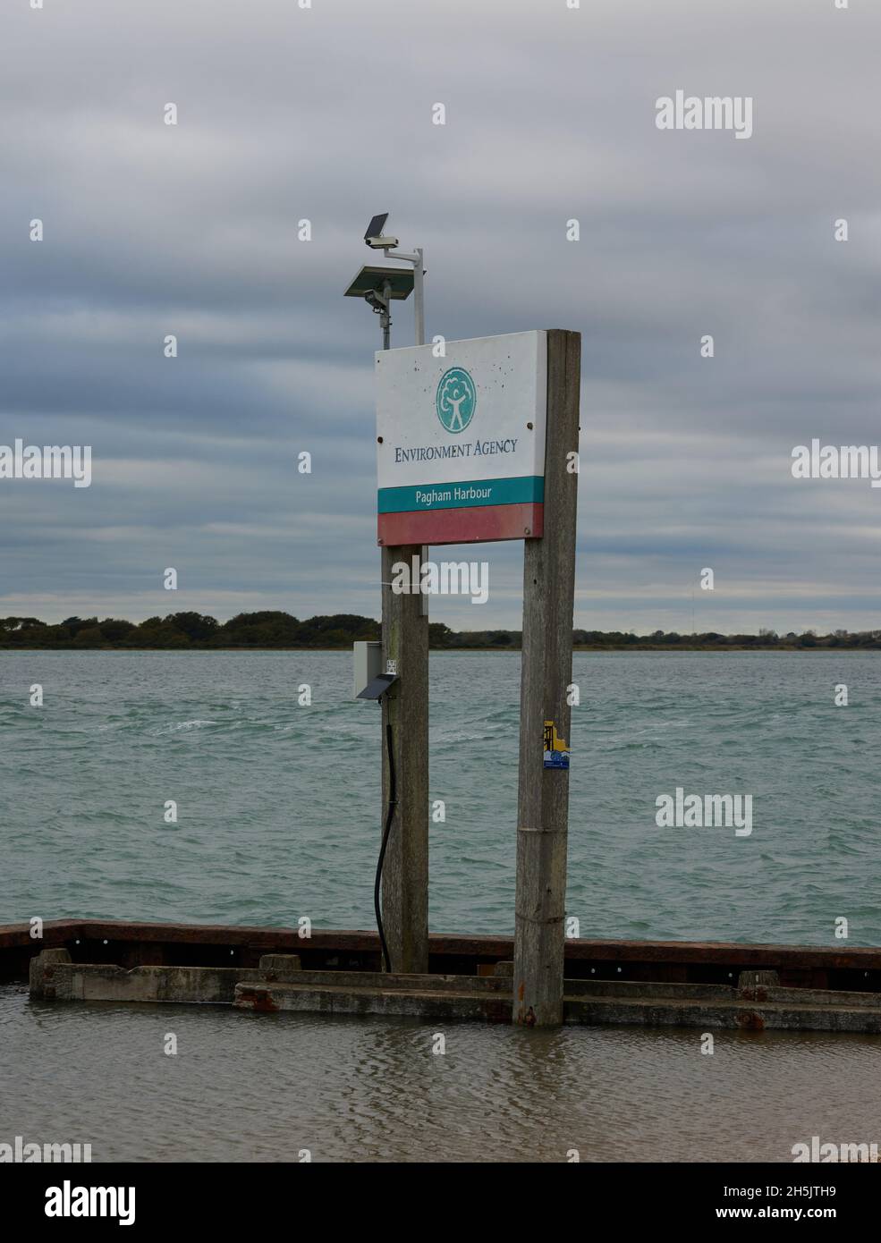 Board of Environment Agency seen on tall posts in Pagham Harbour Nature ...