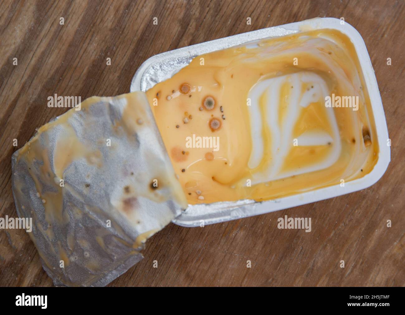Spoiled cheese with mold and mildew. Violation of food storage ...