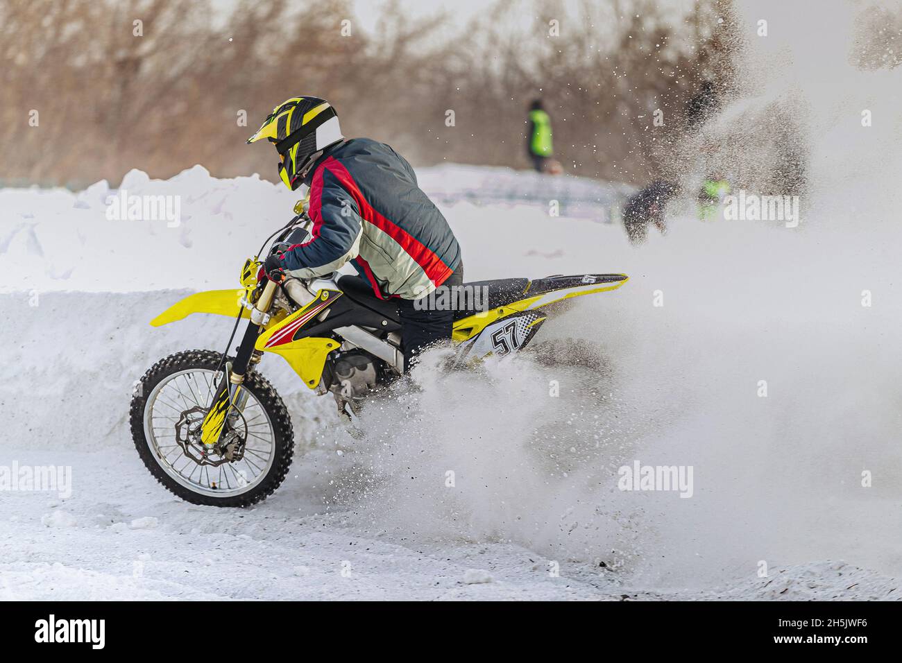 splashes snow and dirt on rear wheel of racing motorcycle Stock Photo ...