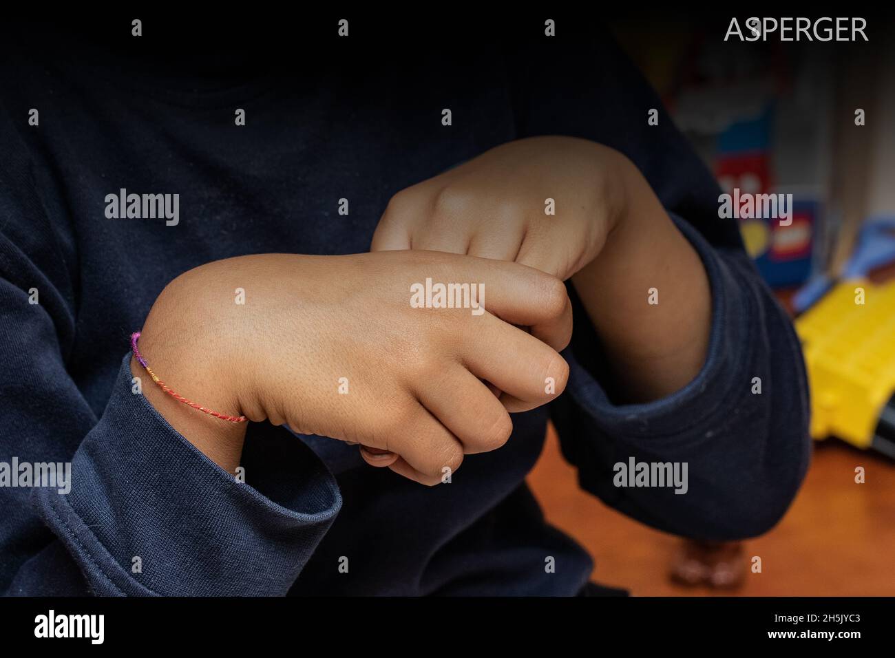 hands of child tightened between them, concept that recalls the ...