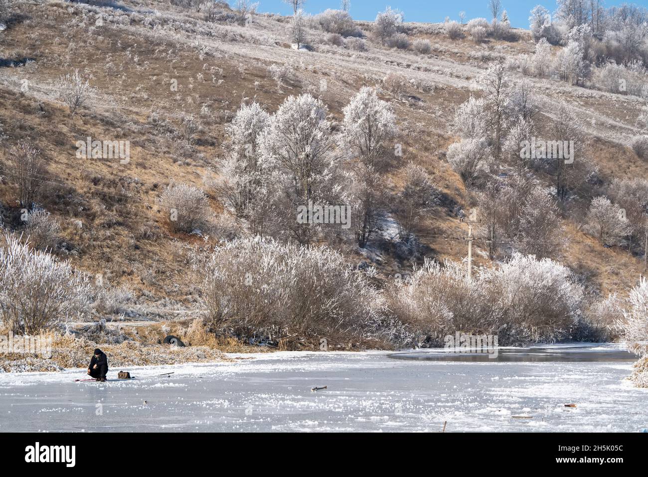fishing, ice; frozen; river Stock Photo - Alamy